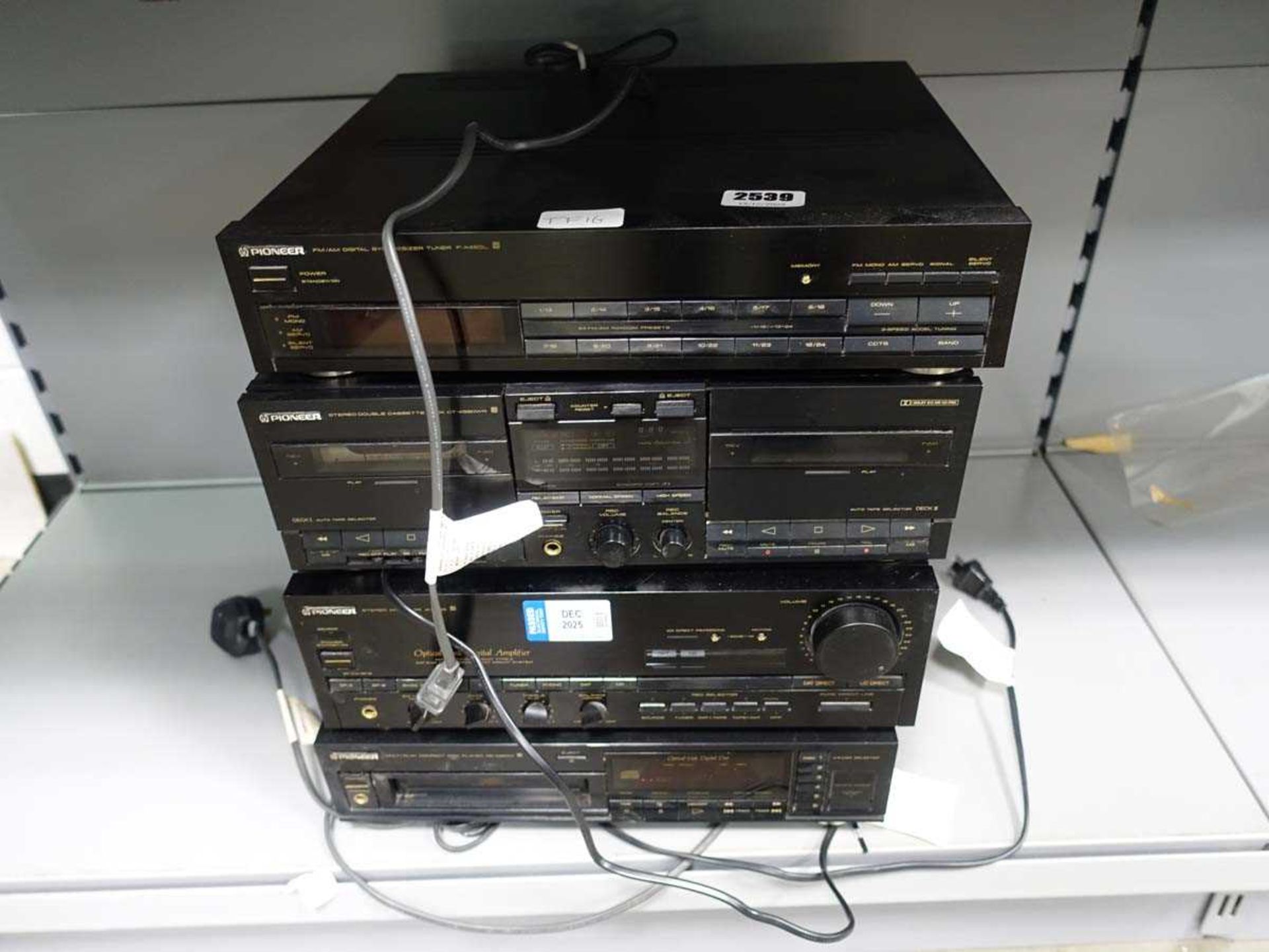 Pioneer stack music system includes tuner, cassette deck, amp., CD player