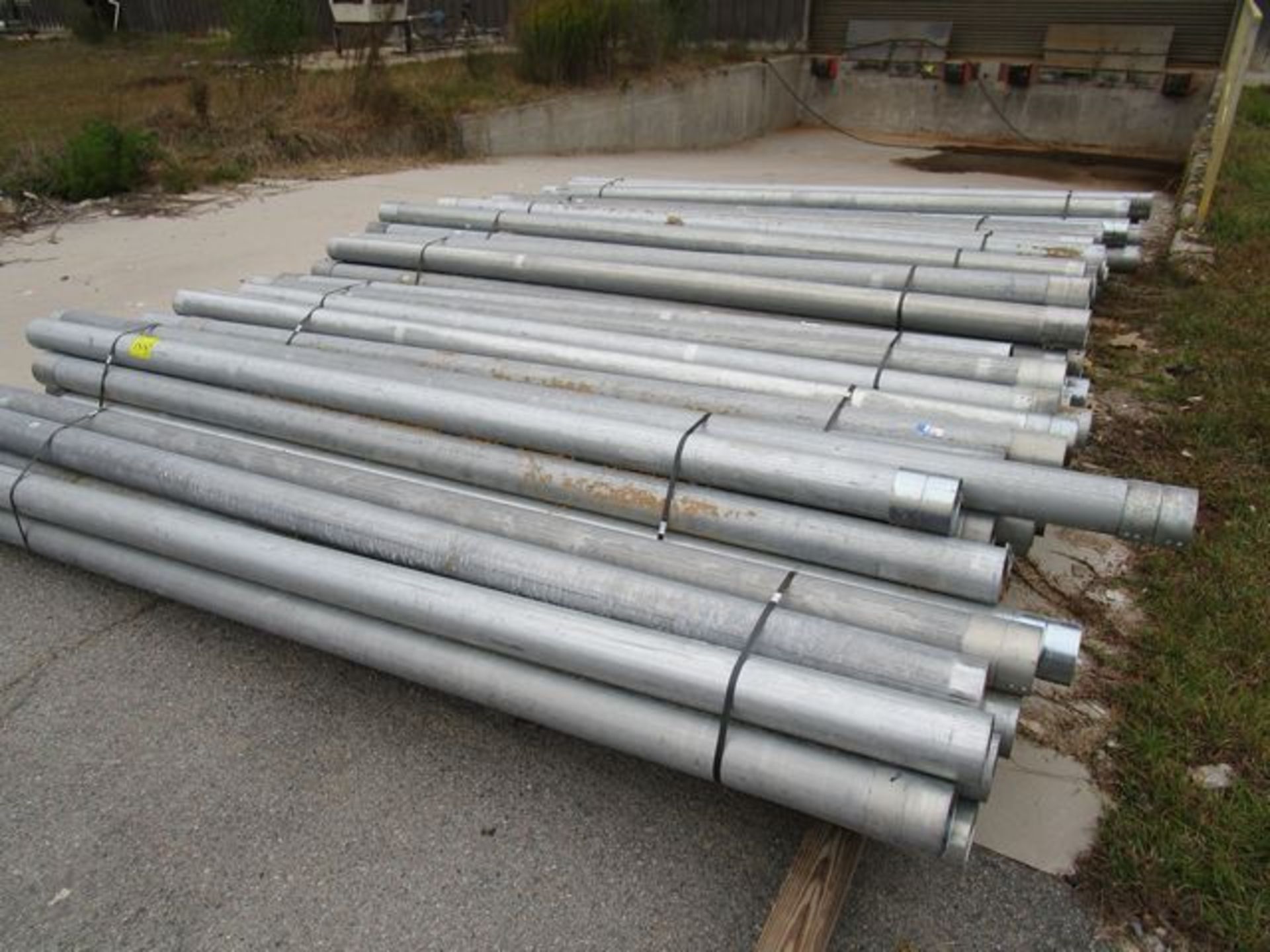 Lot - (9) Bundles of (10) 4 in. x 10 ft. Conduit Poles; (Location ...