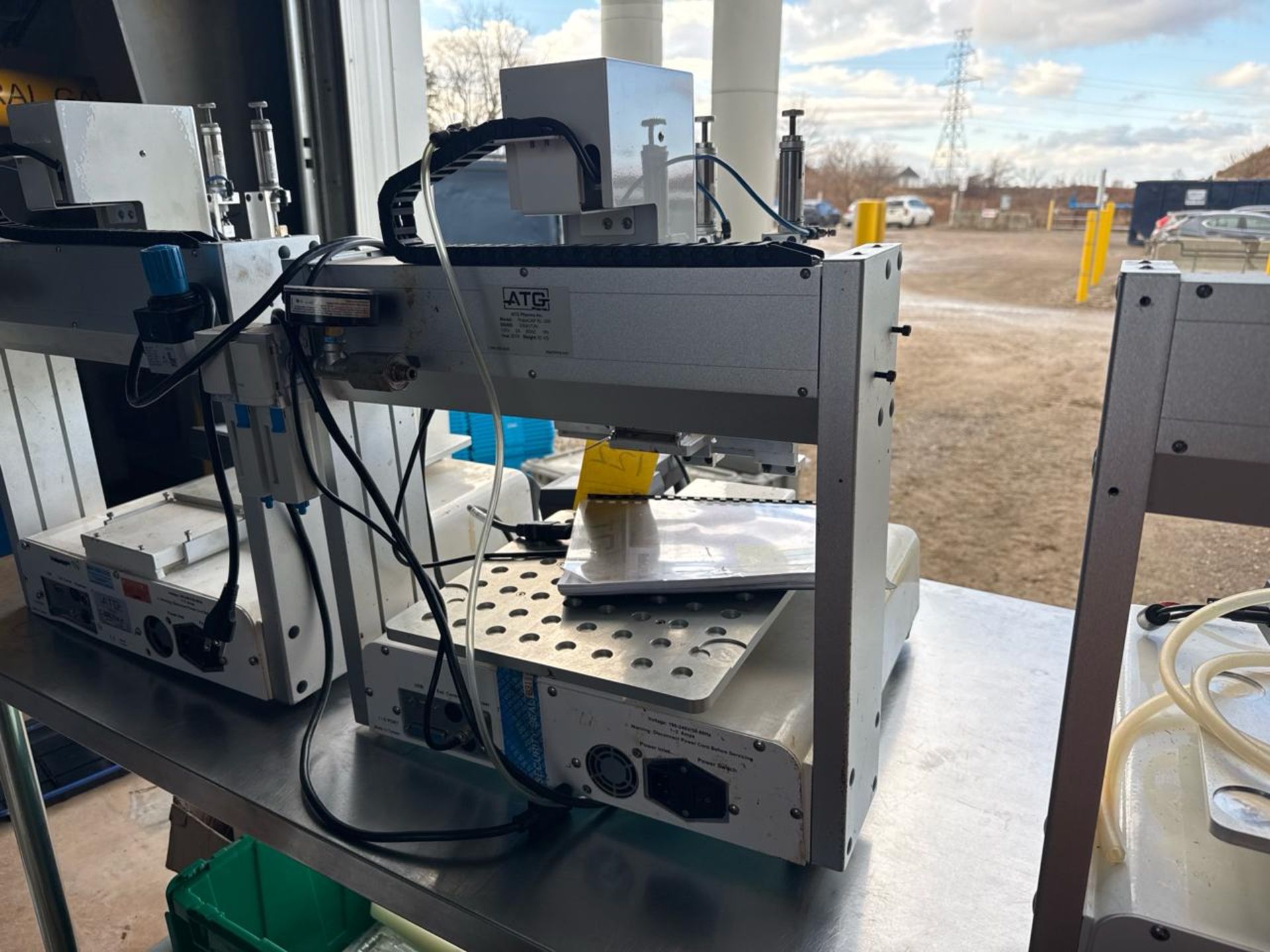 (3) ATG cappers, mod. RoboCap RL-30 c/w (4) ATG Zesta bench counters ...