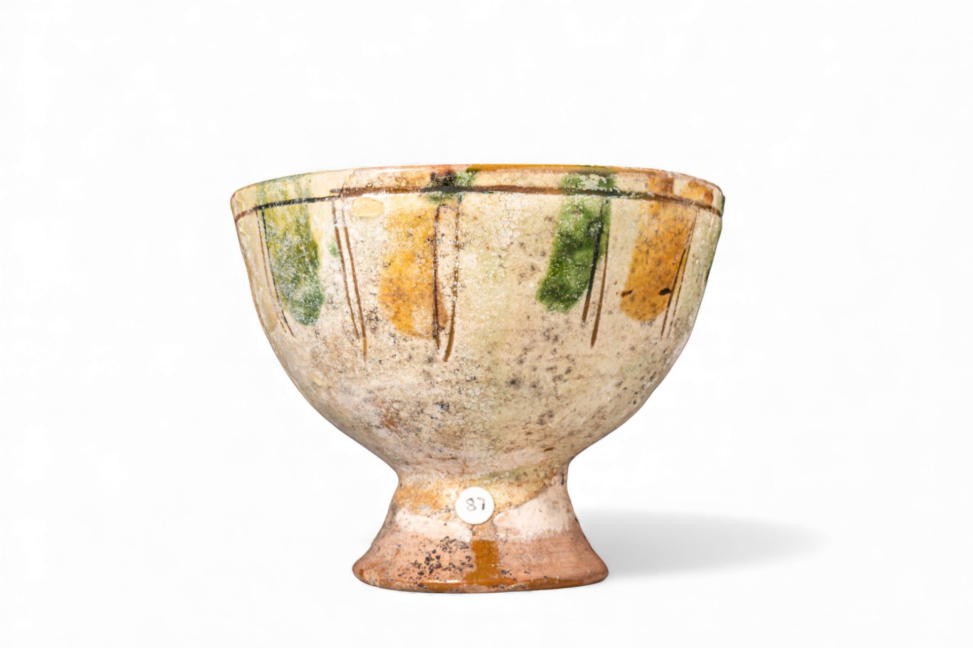 Ca. AD 1300 - 1400 A sgraffito ware cup with a hemispherical bowl set ...