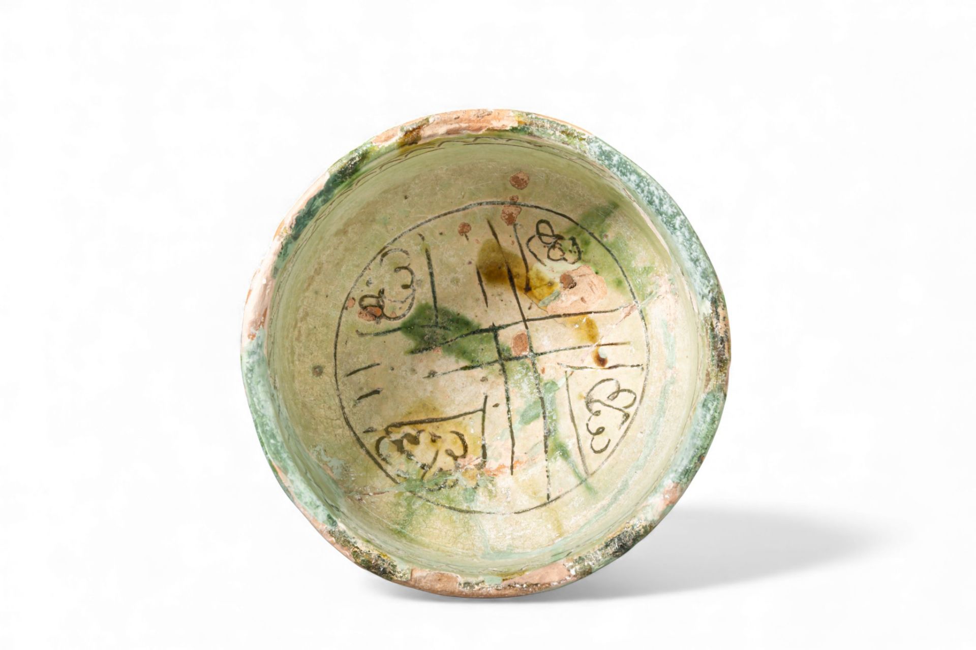 Ca. AD 1300 - 1400 A sgraffito ware cup with a deep bowl on a tall ...