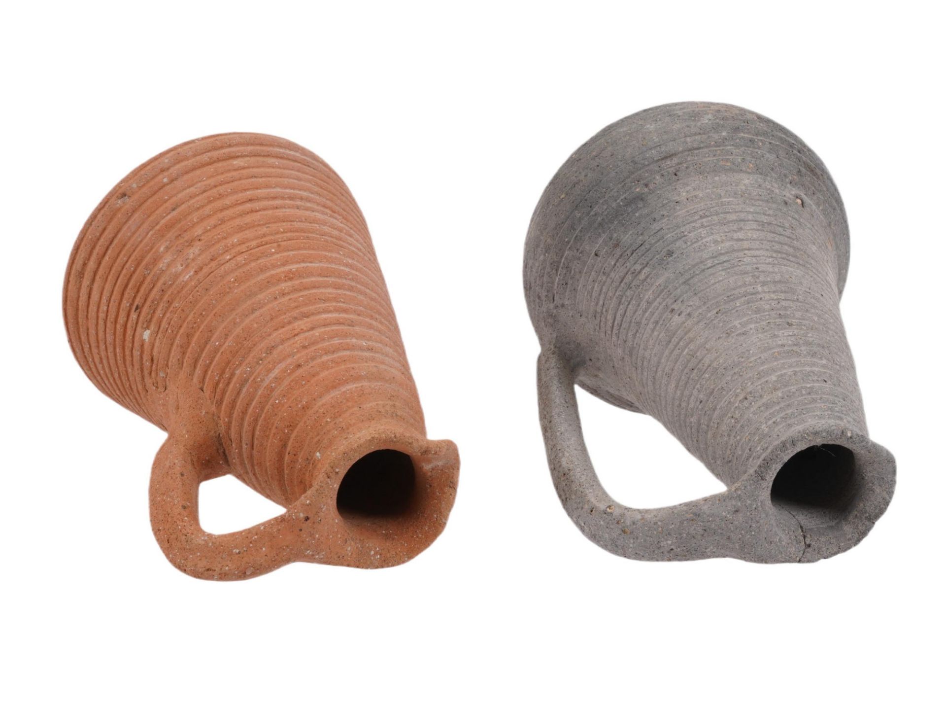 A pair of ancient Roman or Byzantine Empire terracotta pottery pitchers ...
