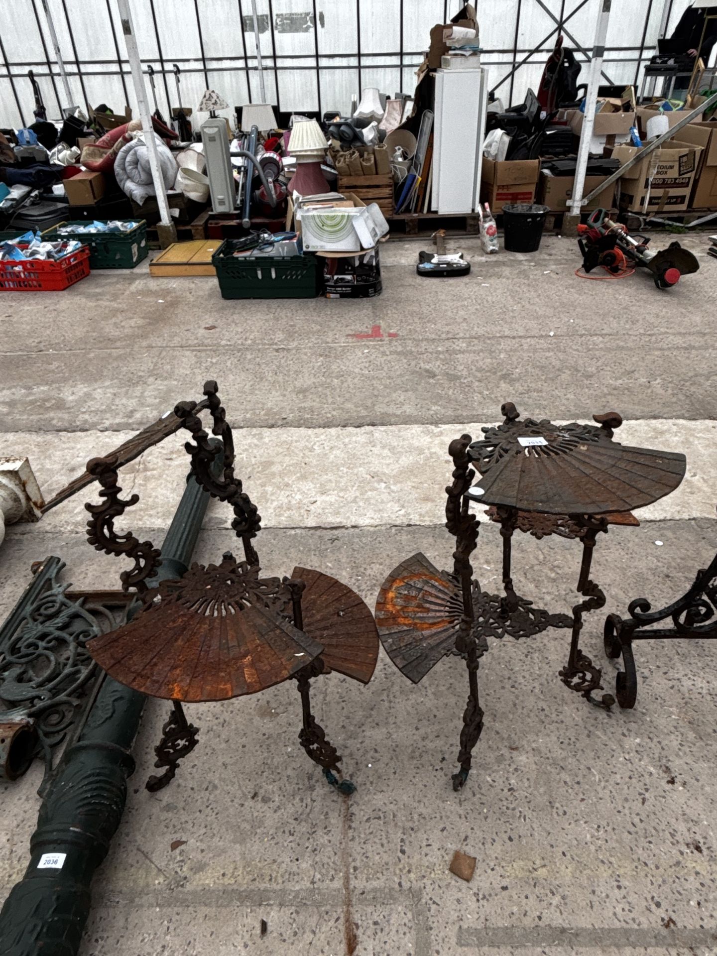 TWO VINTAGE DECORATIVE IRON PAN STANDS