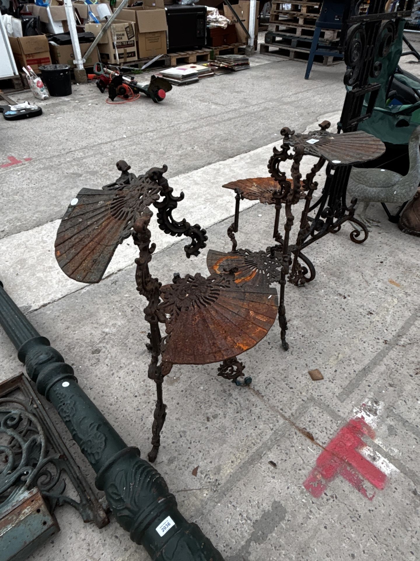 TWO VINTAGE DECORATIVE IRON PAN STANDS
