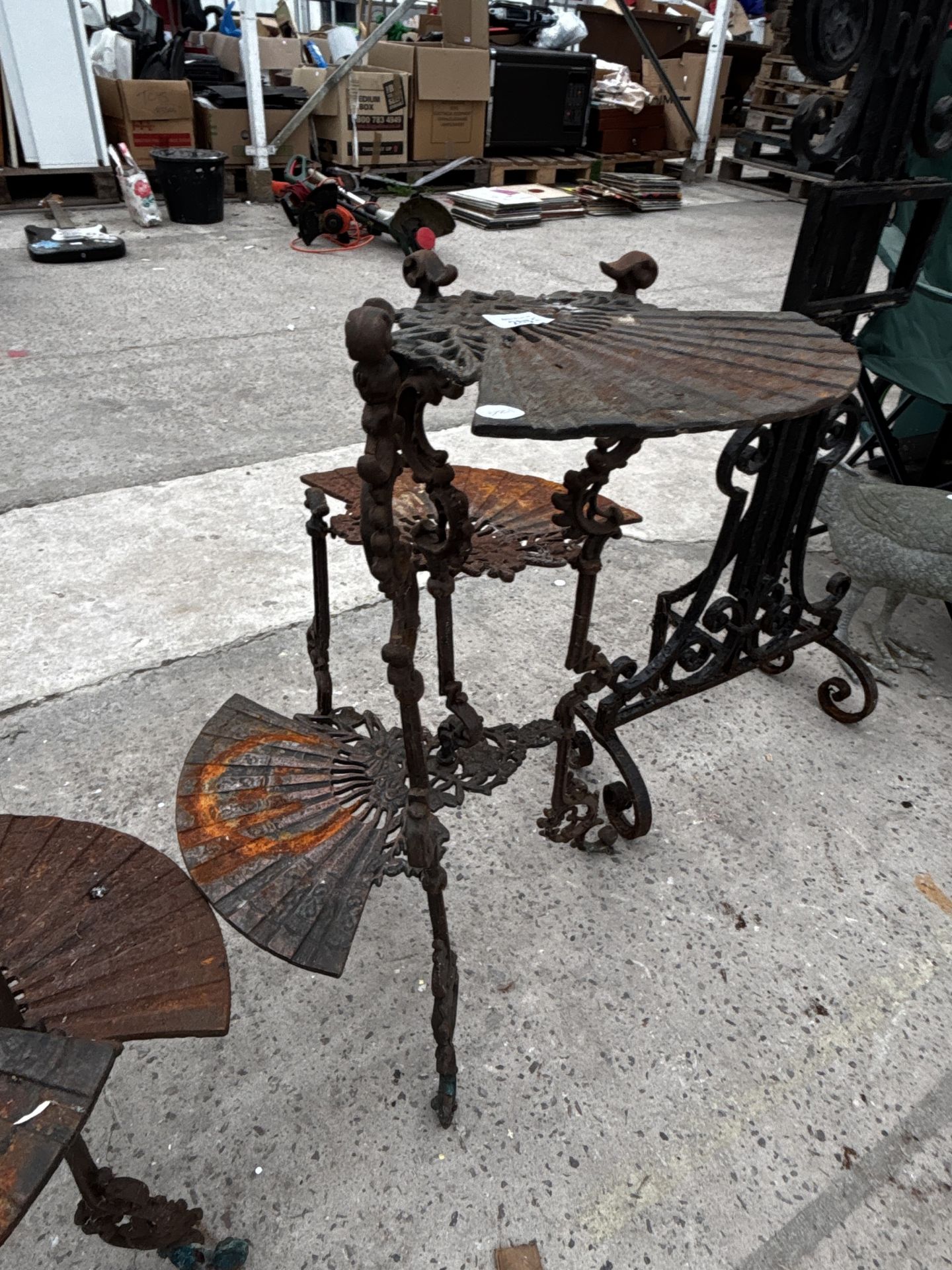 TWO VINTAGE DECORATIVE IRON PAN STANDS