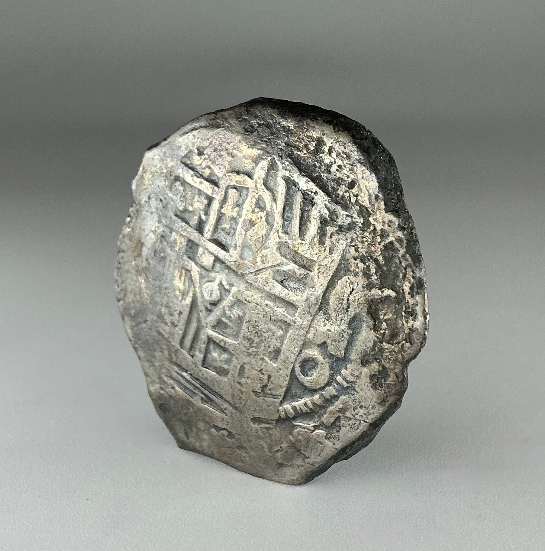 A 17th century piece of eight or eight Reales, within a Spink & Son box ...