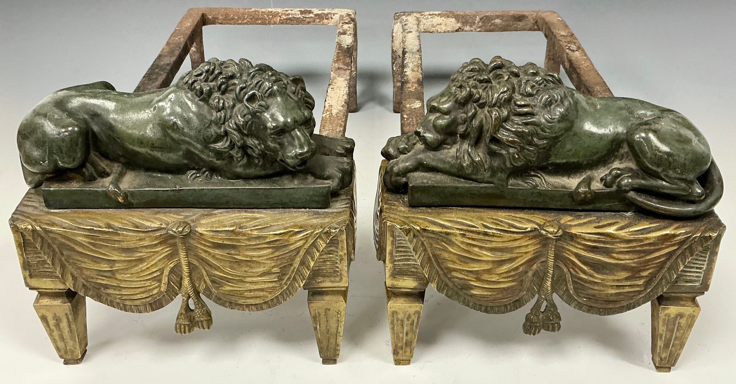 A pair of 19th century verdigris paginated bronze mounted chenets, cast ...
