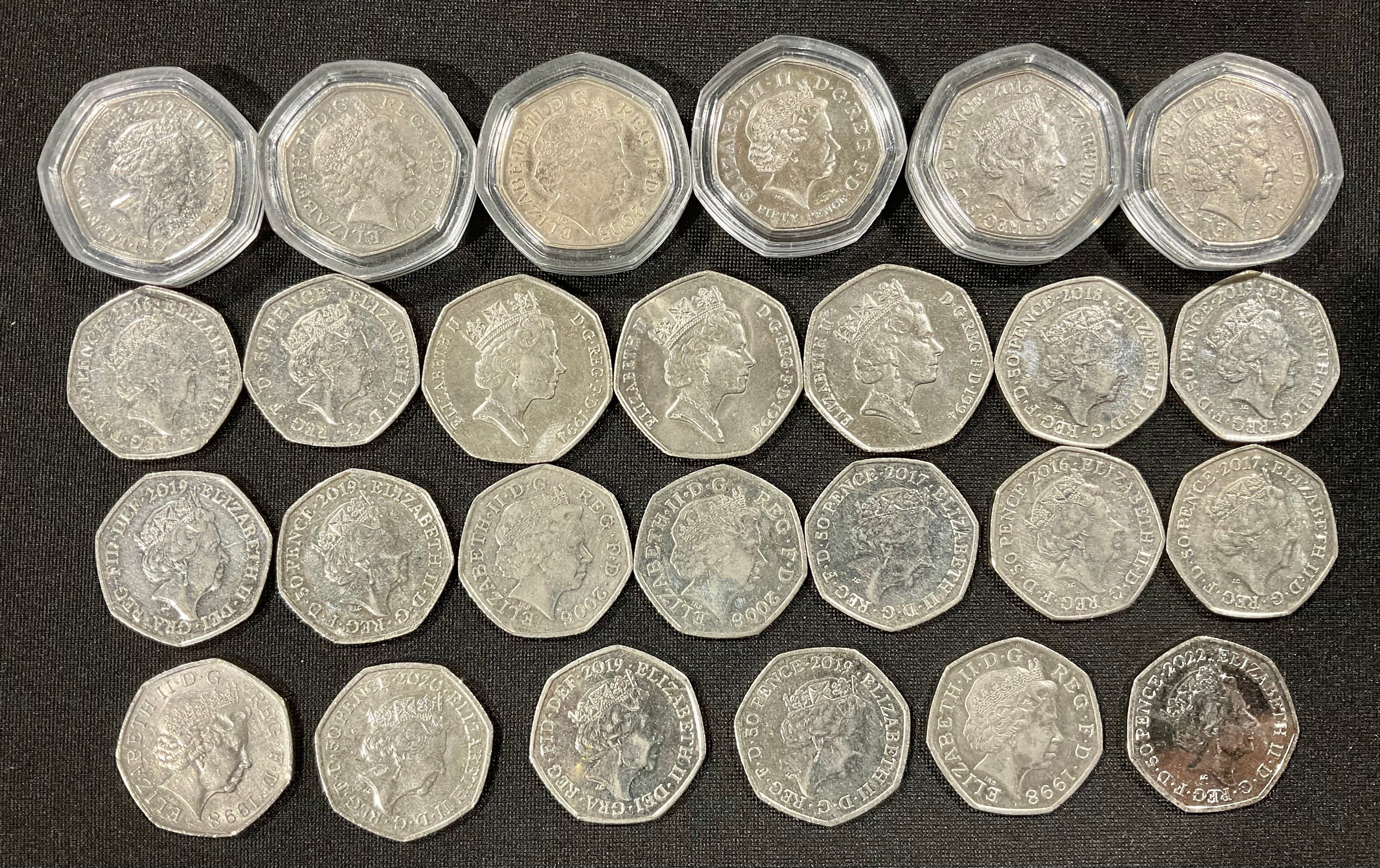 Numismatics - a collection of twenty six fifty Pence pieces (50Ps) inc ...