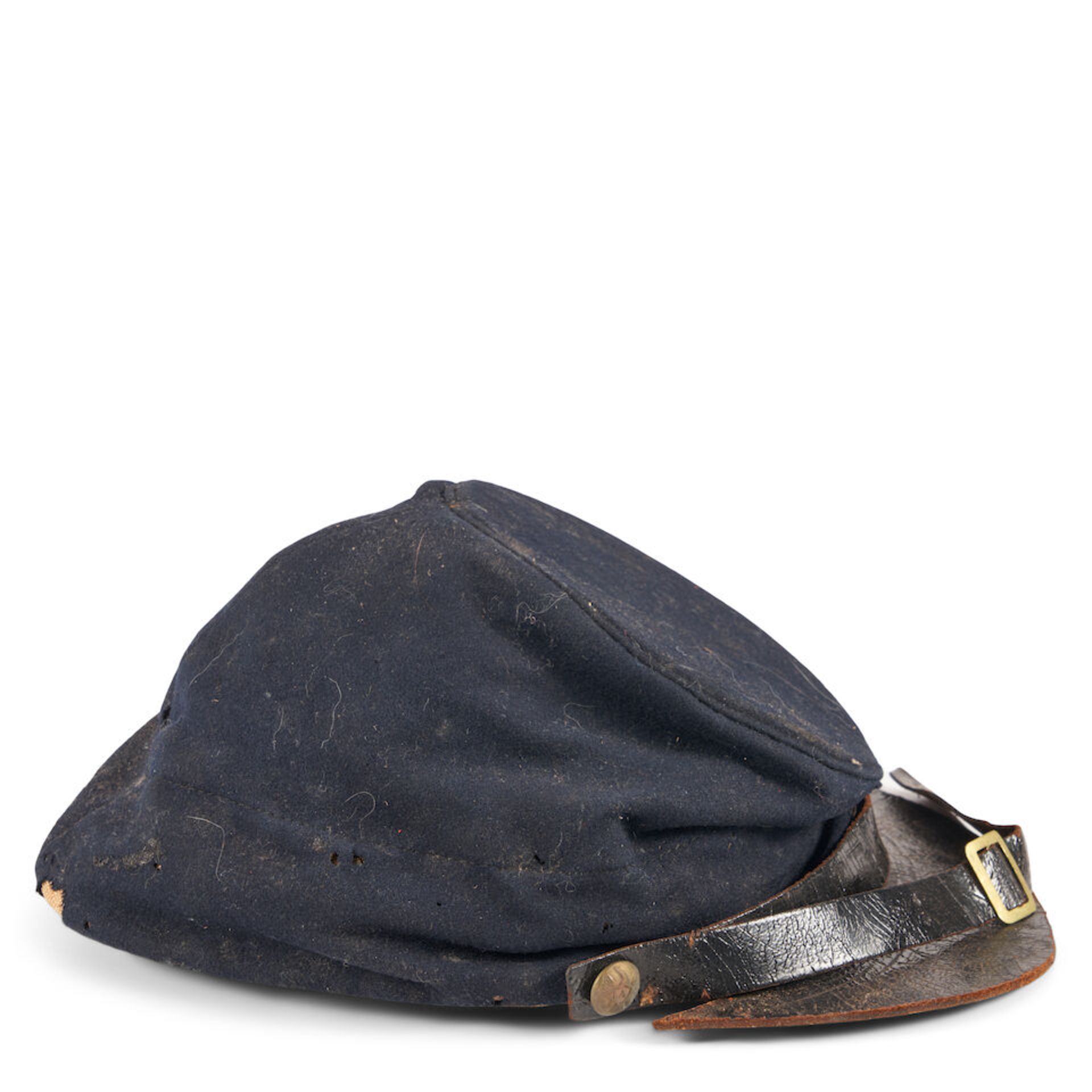 A CIVIL WAR ARTILLERY FORAGE CAP. Blue cloth body with eagle 'A ...