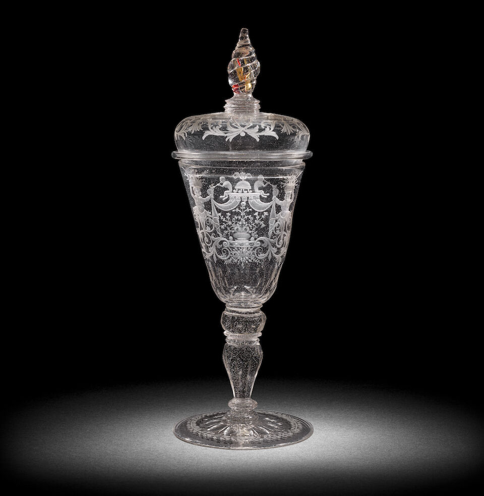 A Bohemian engraved goblet and a cover, circa 1720-30 The generous ...