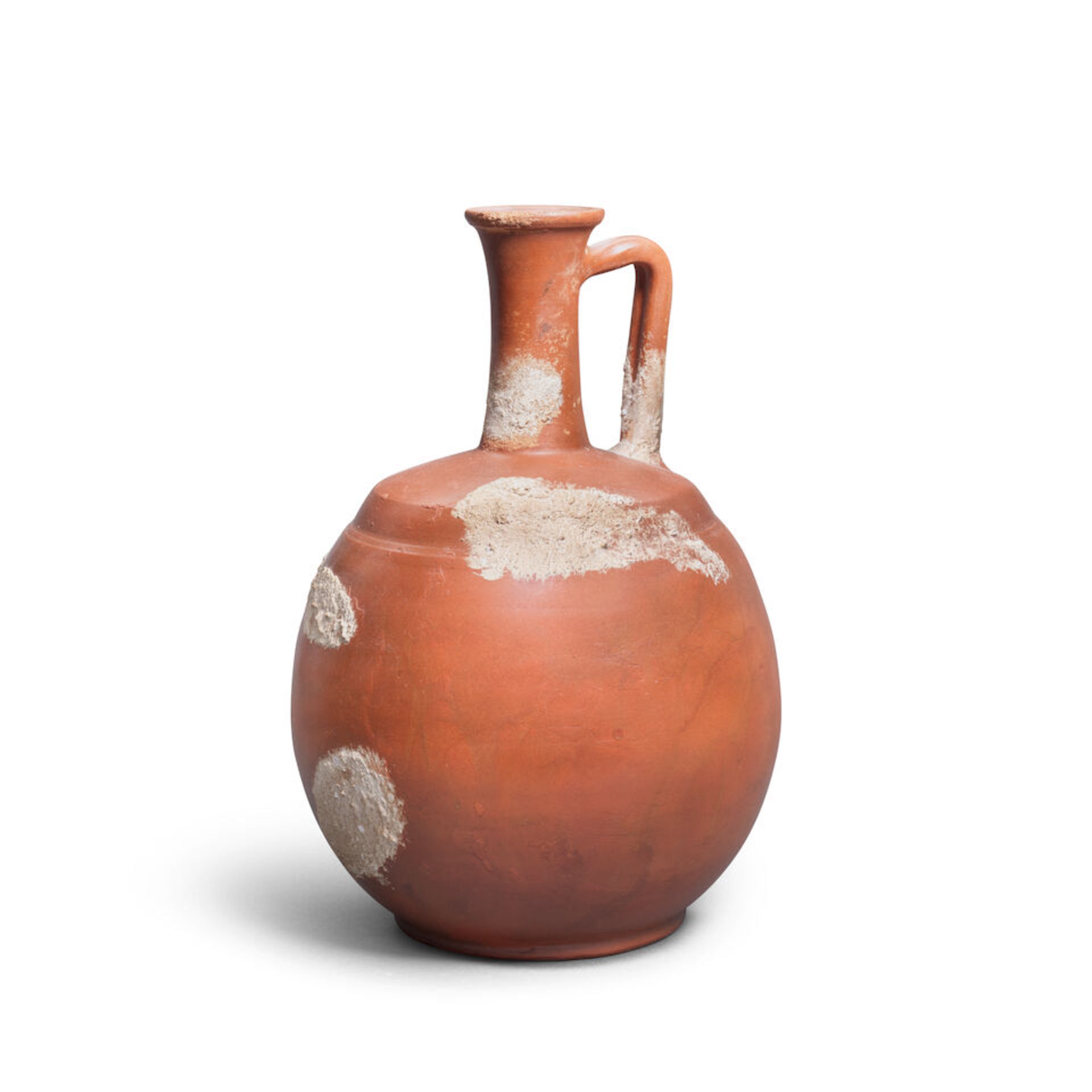 A Roman-style red slip ware jug 20th Century The narrow neck with ...