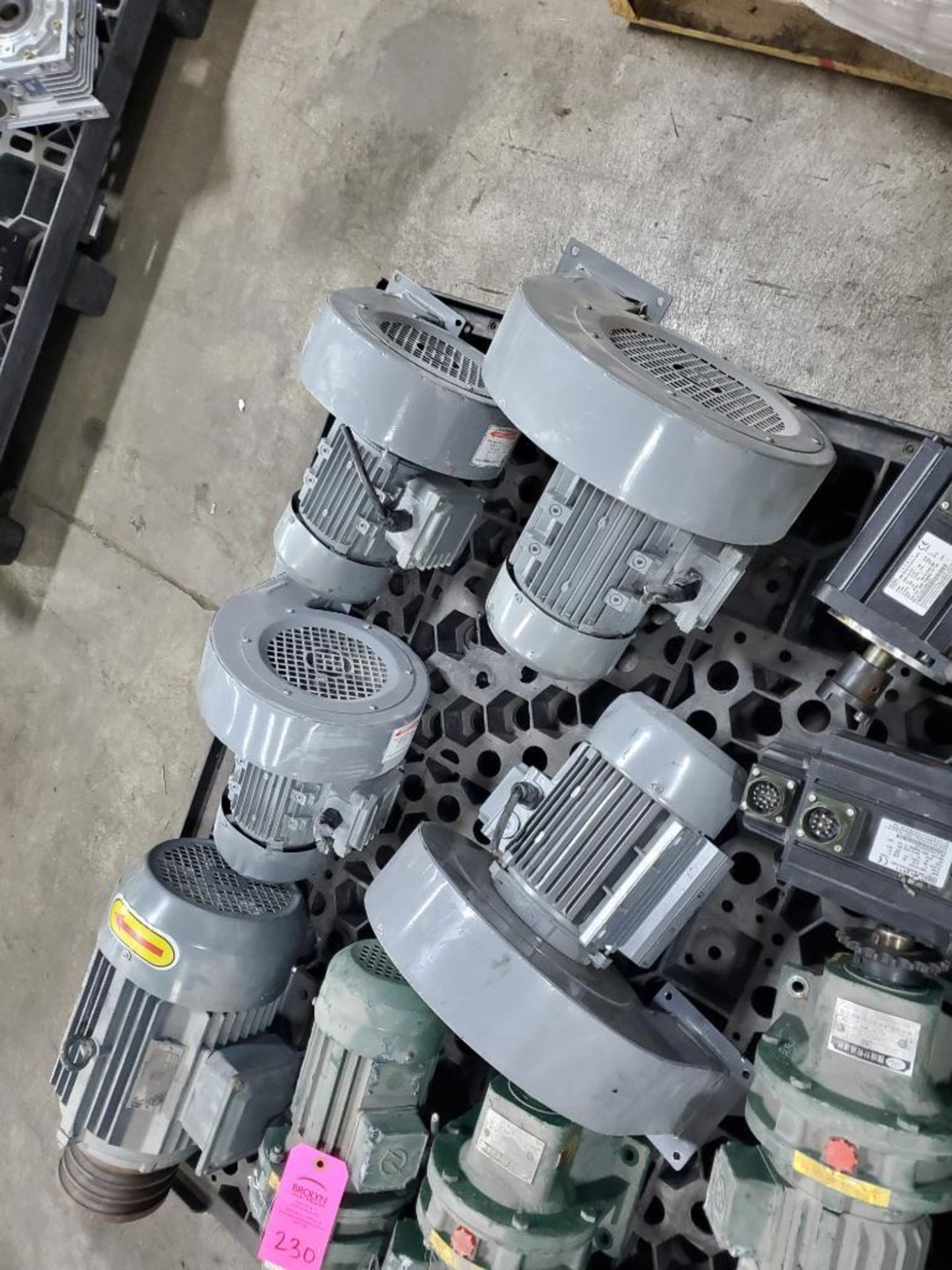 Assorted electrical motors. For a $40 fee this lot can be prepared for ...
