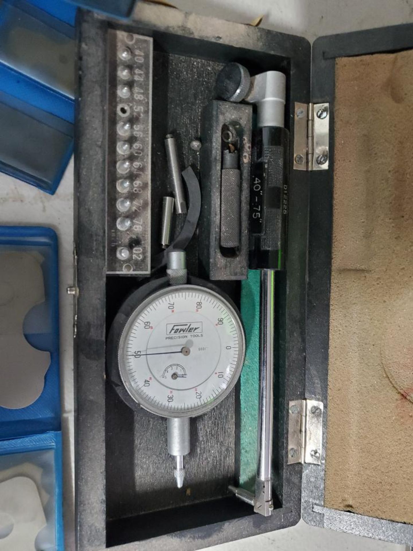 Assorted shim feeler gauges and Enco indicator.