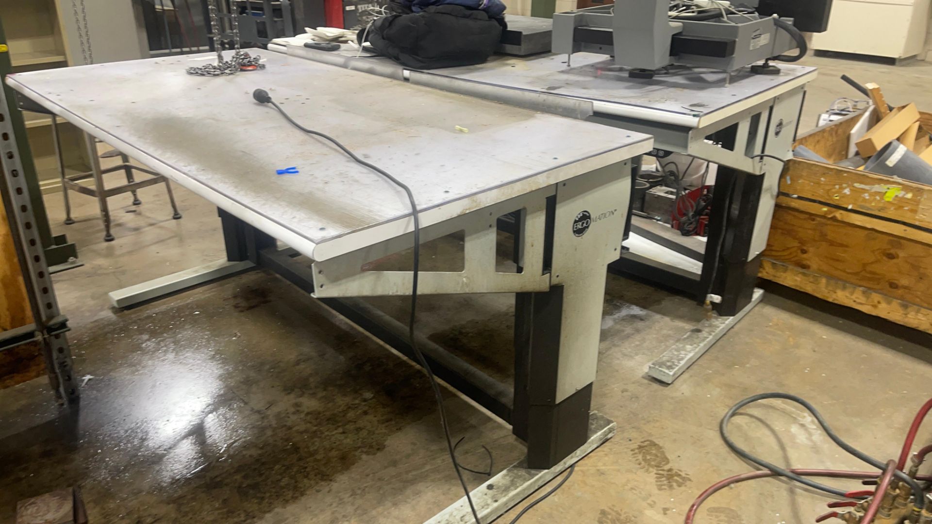 Two electric lift tables