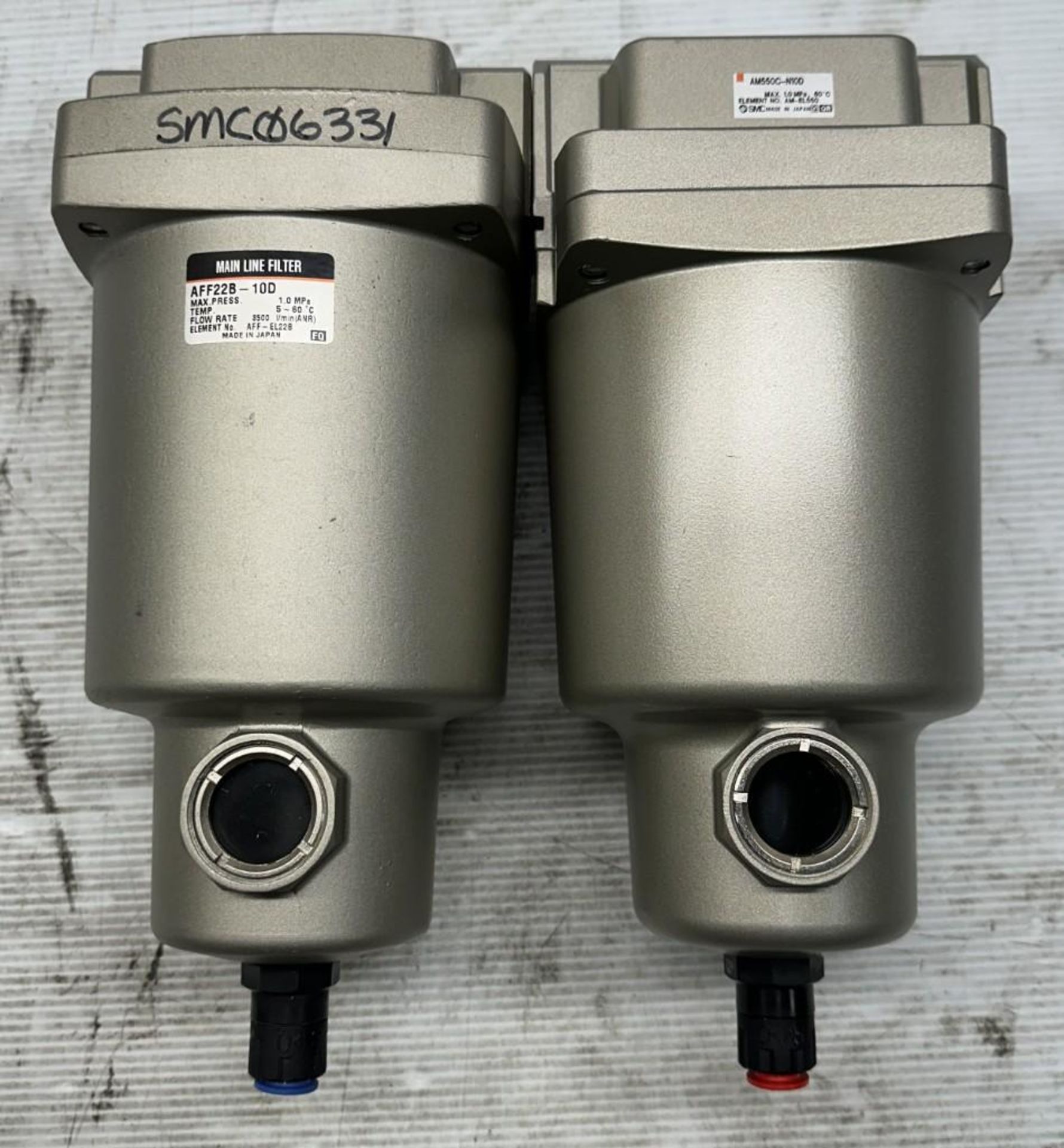Lot of (2) SMC Filter Elements Lot Includes 1-#AFF22B-10D 1-#AM550C ...