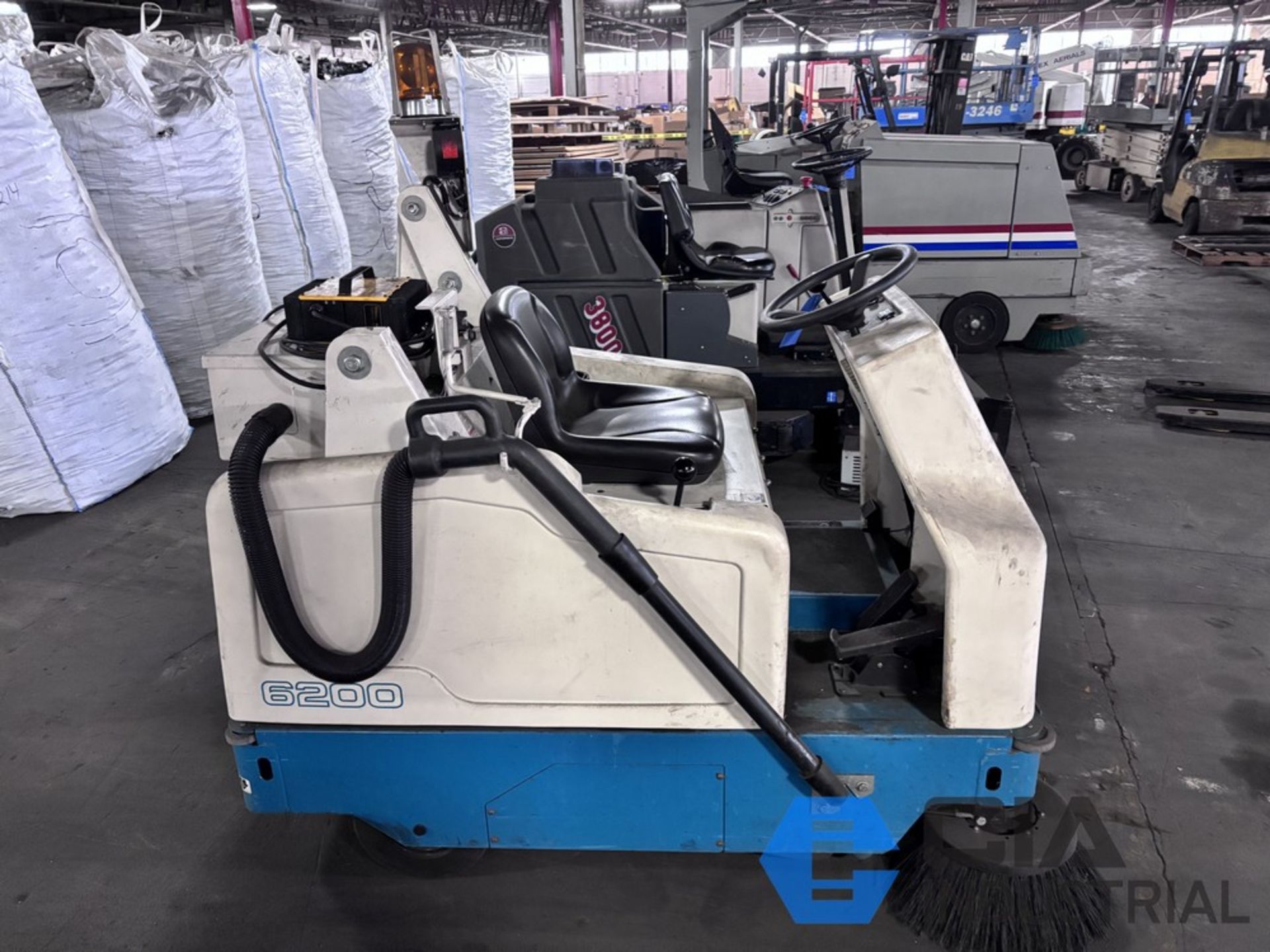 TENNANT MODEL 6200 ELECTRIC RIDE ON FLOOR SWEEPER / SCRUBBER; S/N 6200 ...