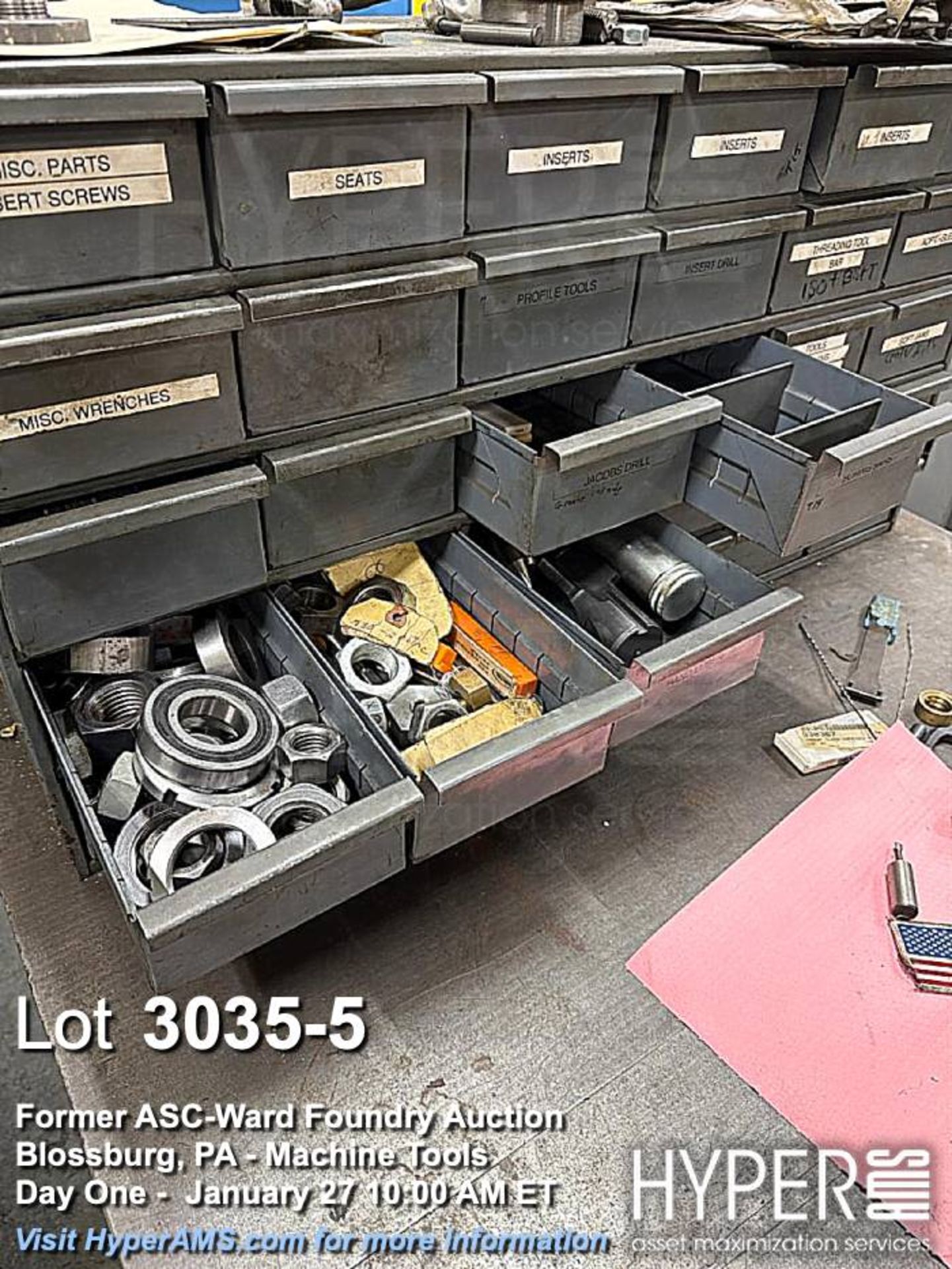 Workbench with machinist vise and metal organizer with contents ...