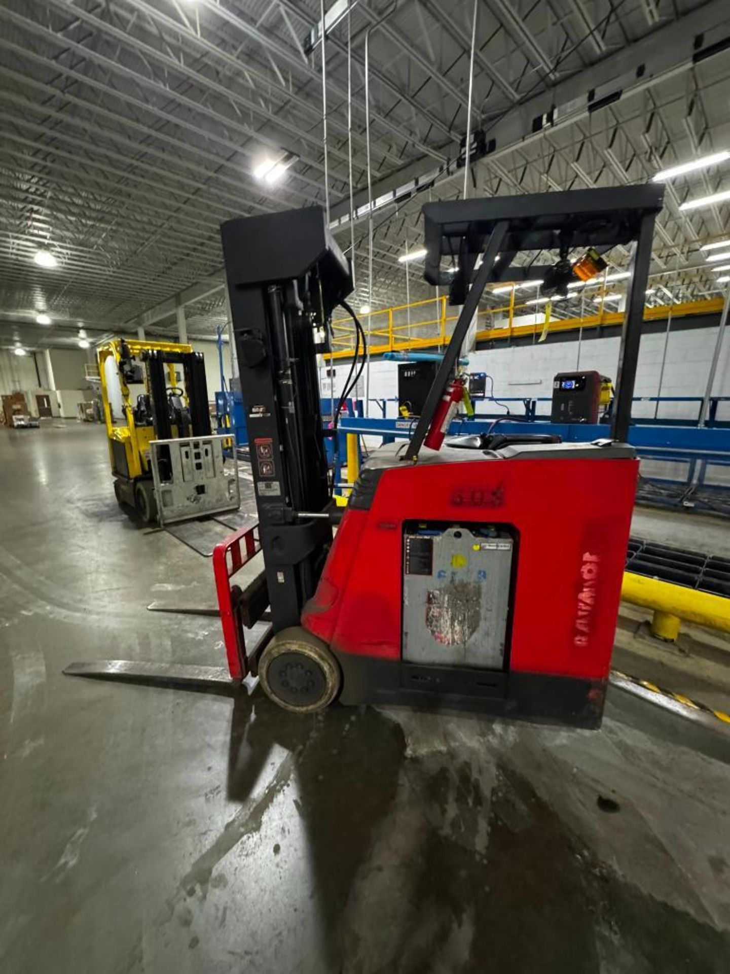 2005 Raymond 3,500 LB. 36V Narrow Aisle Stand Up Forklift, 4-Stage Mast ...