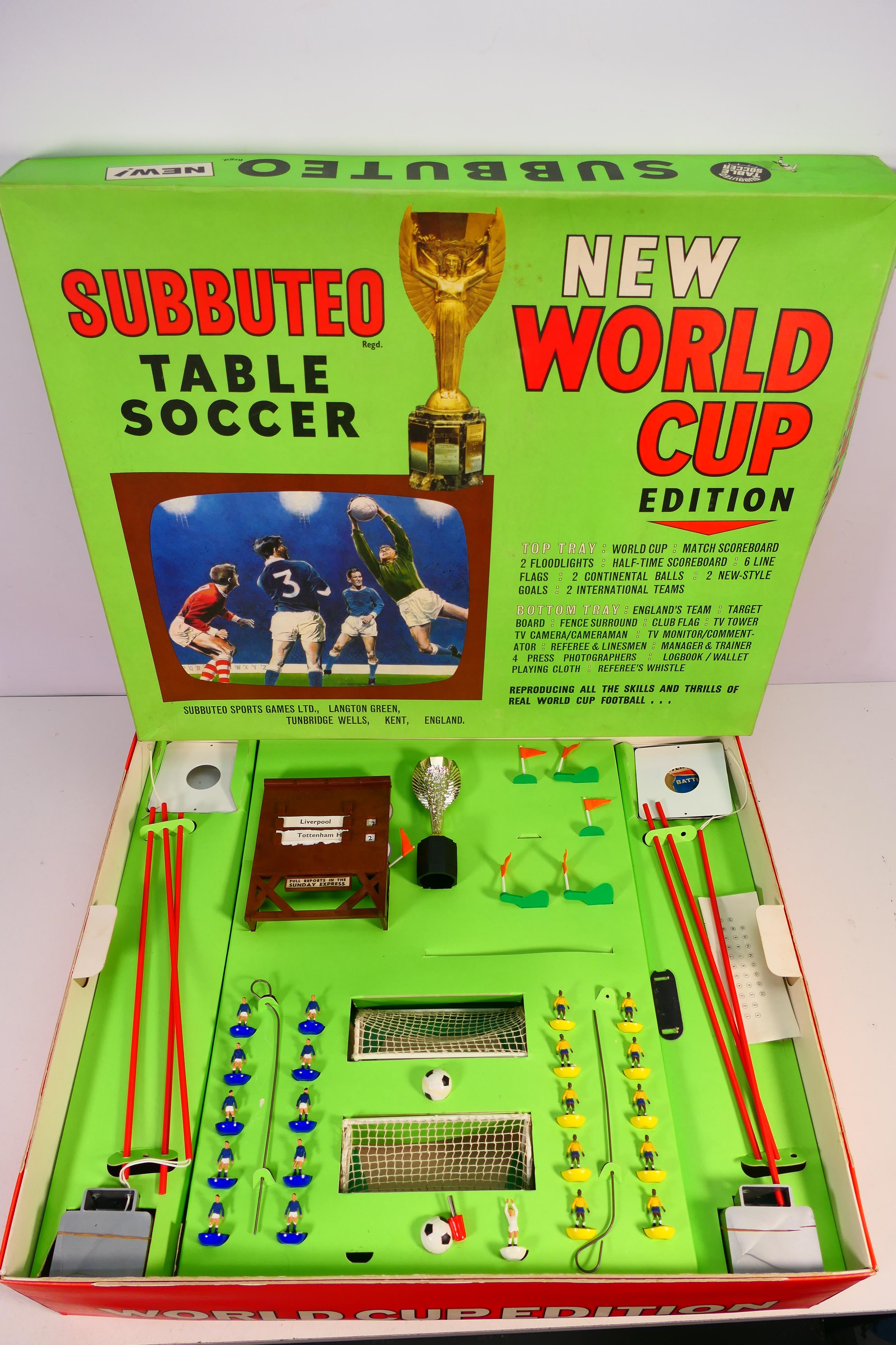 Subbuteo - A vintage boxed Subbuteo New World Cup Edition set. The set ...