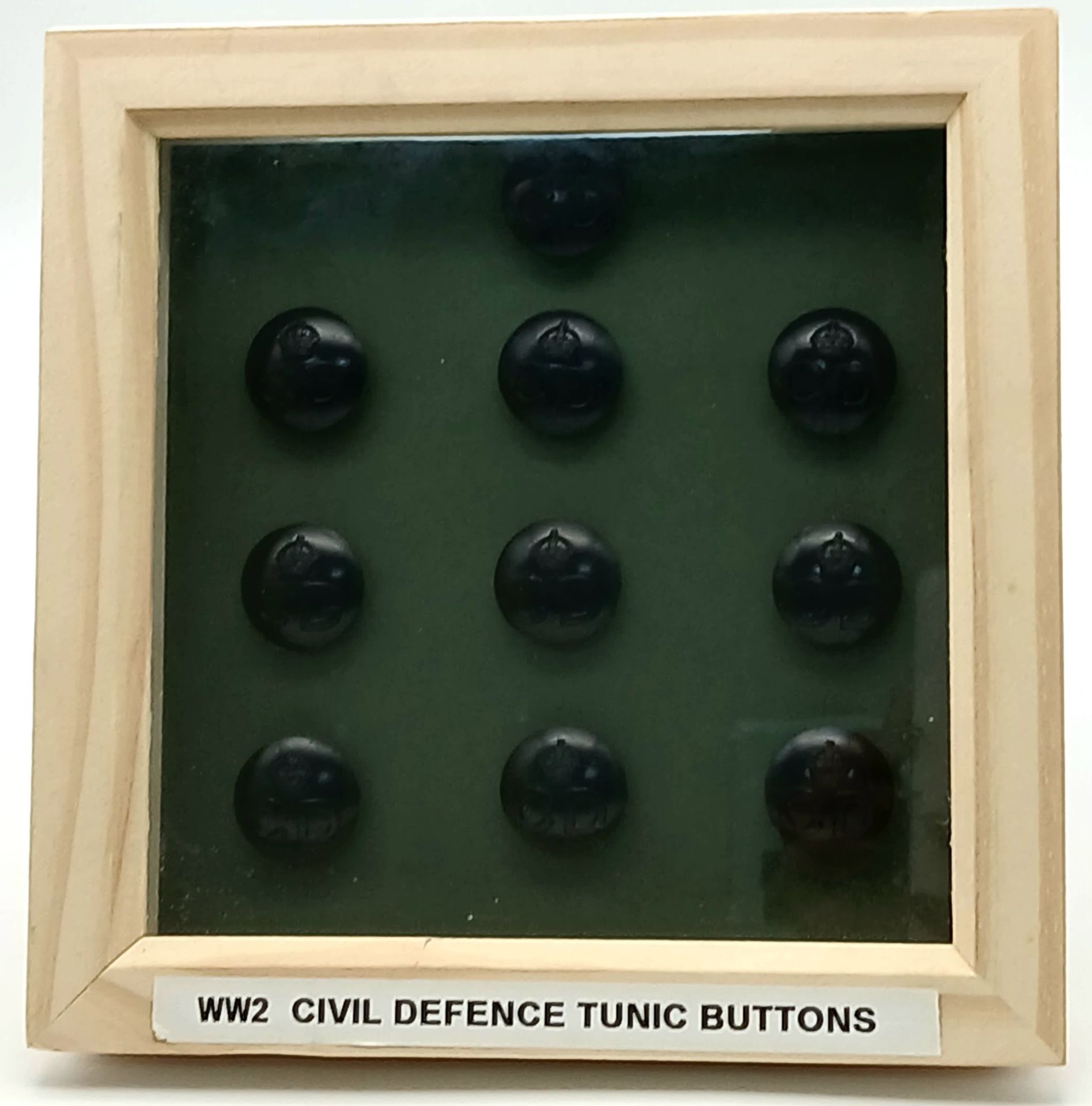 A Framed Set of WW2 Civil Defense Tunic Buttons. 19x 19cm.
