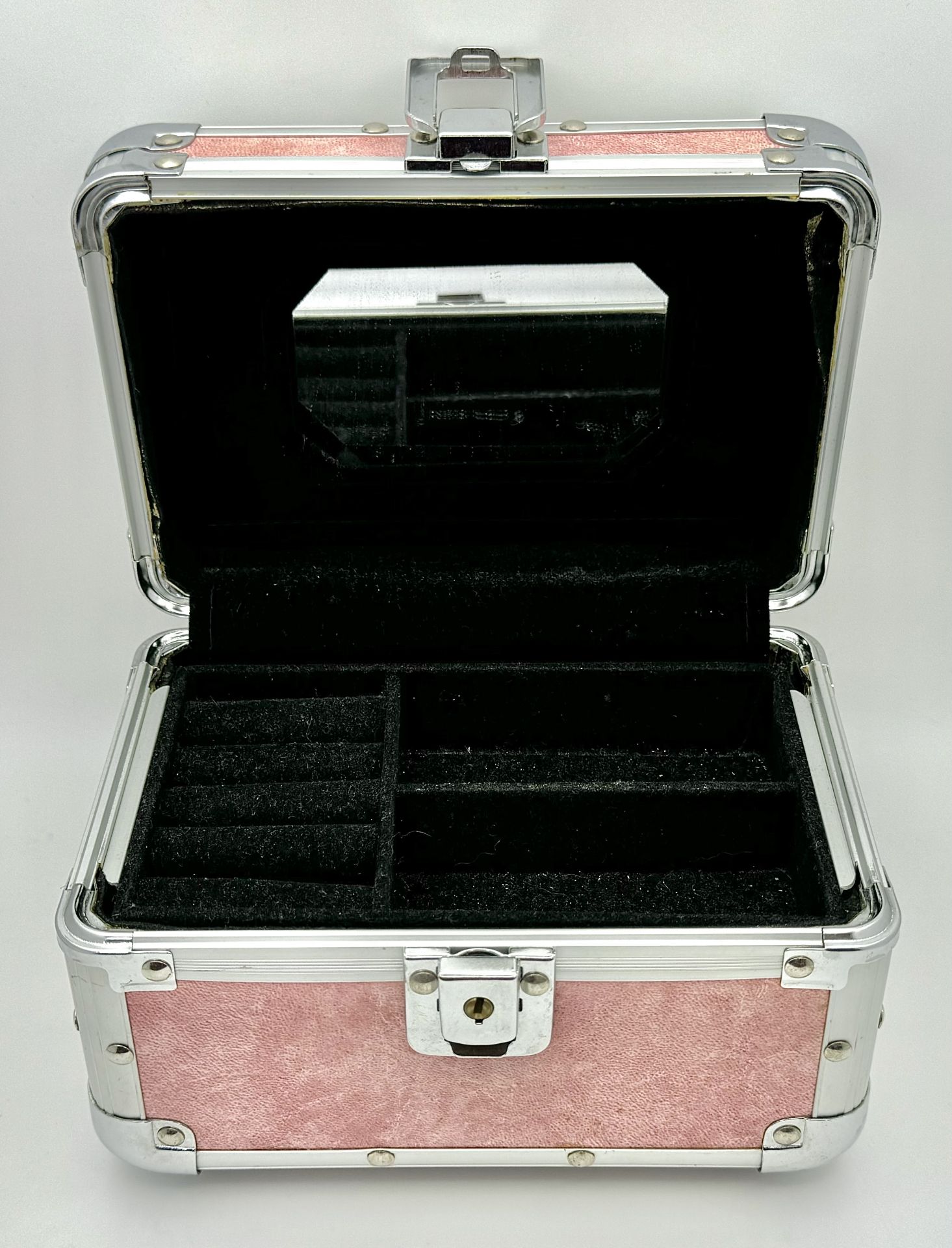 A beautiful pink textured rectangular travel jewellery box with mirror ...