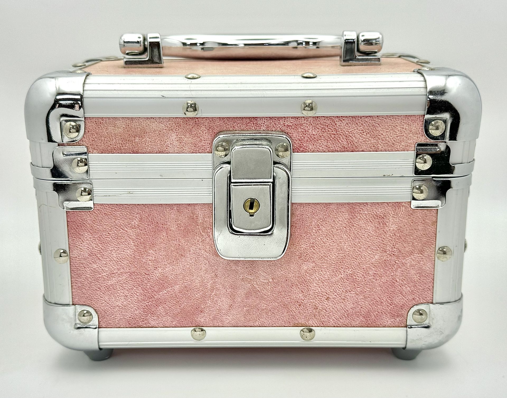 A beautiful pink textured rectangular travel jewellery box with mirror ...