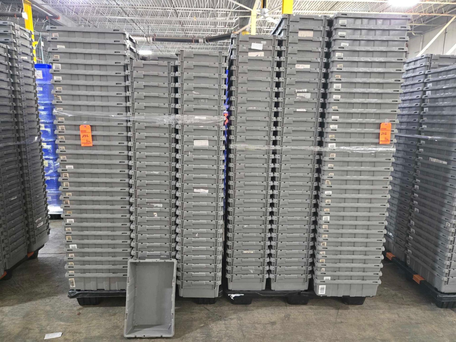 Lot of +/- 300 Orbis grey totes 20 inches (L) X 13 inches (W) X 6 ...