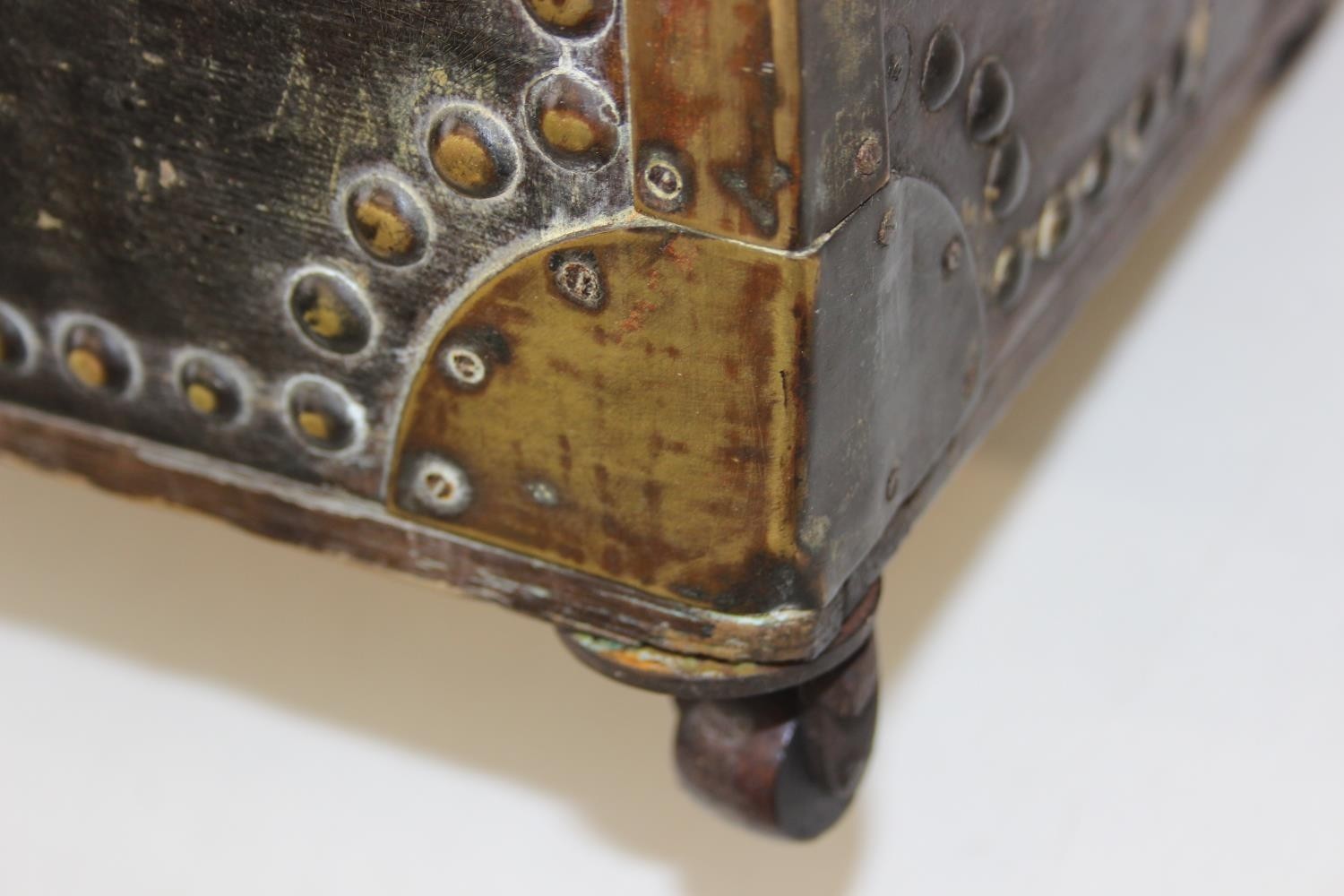 A vintage leather and brass covered chest or strong box, studded ...