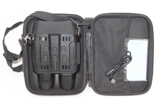 A boxed pair of night vision binoculars by OMG Electronics