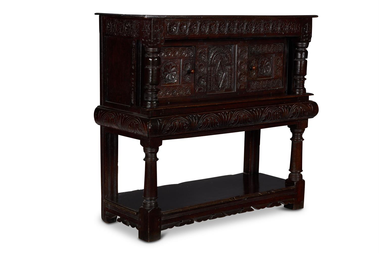 A CHARLES I OAK LIVERY OR COURT CUPBOARD CIRCA 1630 The upper section ...