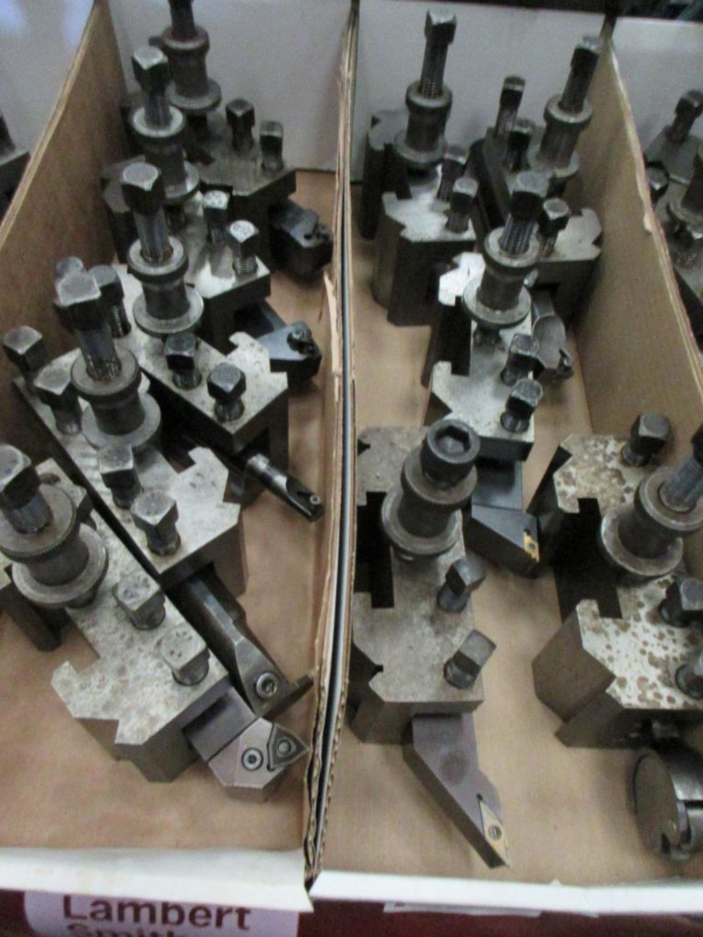 Two tote boxes of assorted indexable lathe tool holders with some inserts