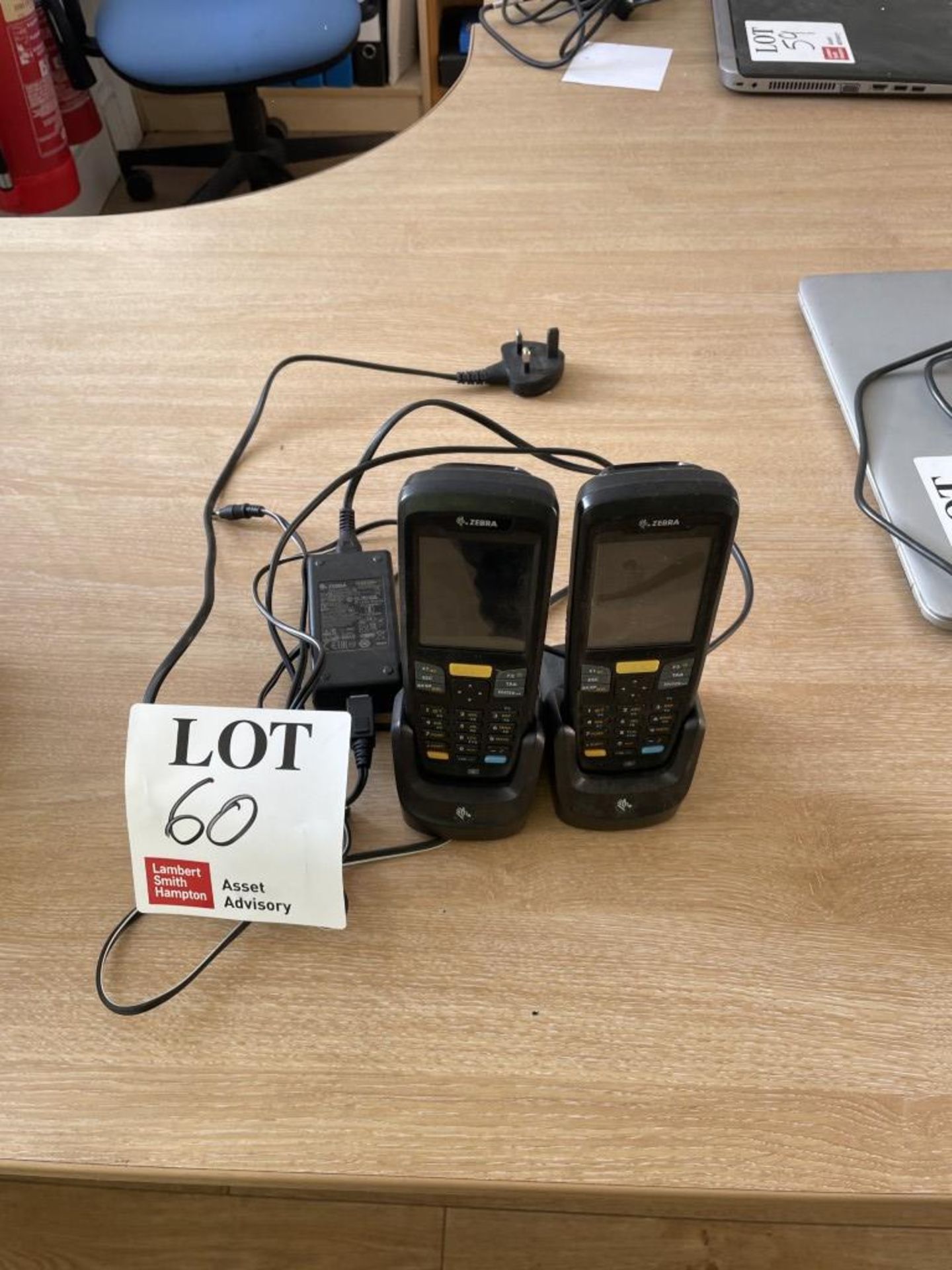 2 - Zebra MC2180 scanners, with docking stations