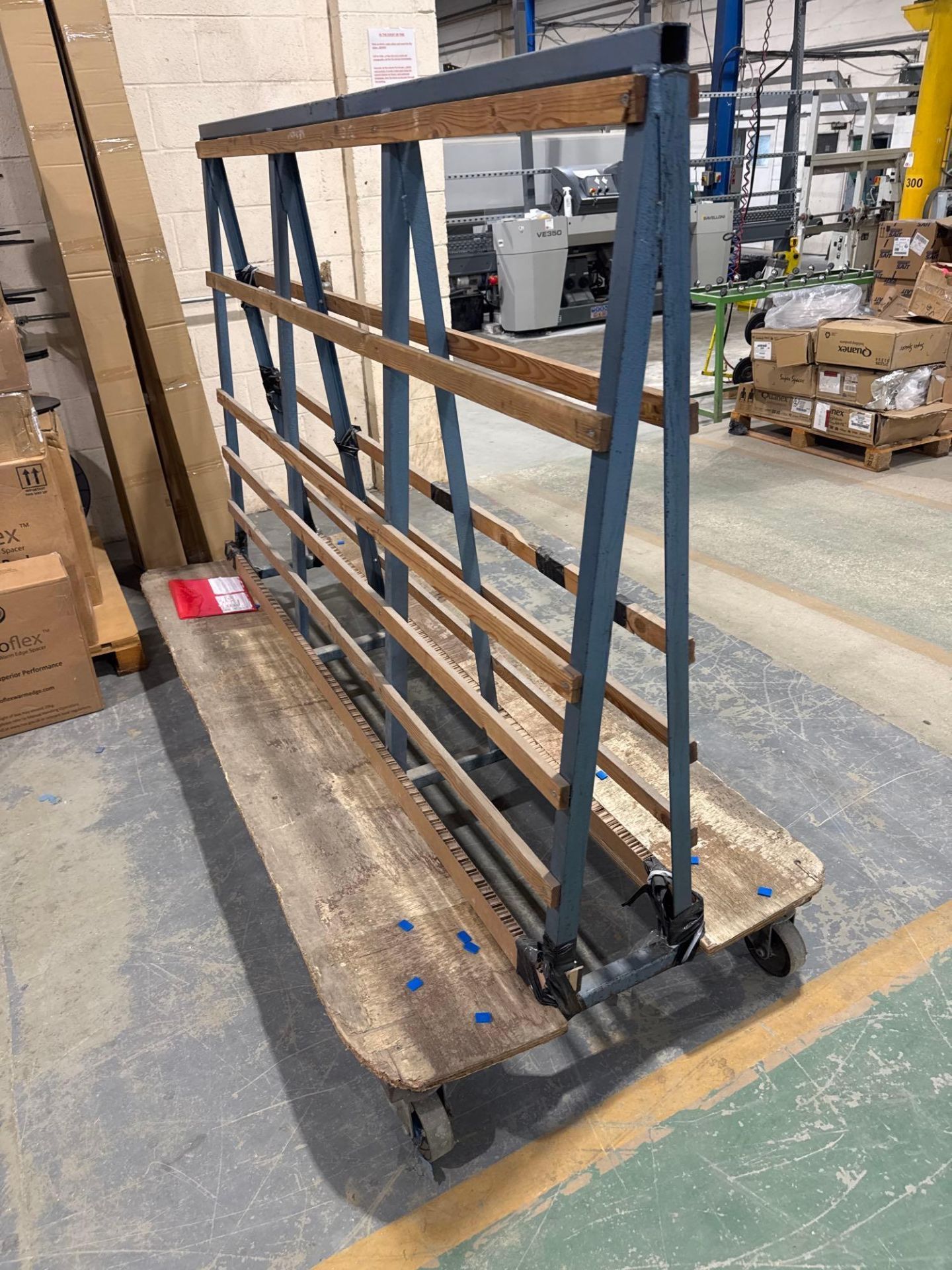 Various steel framed mobile glass cart
