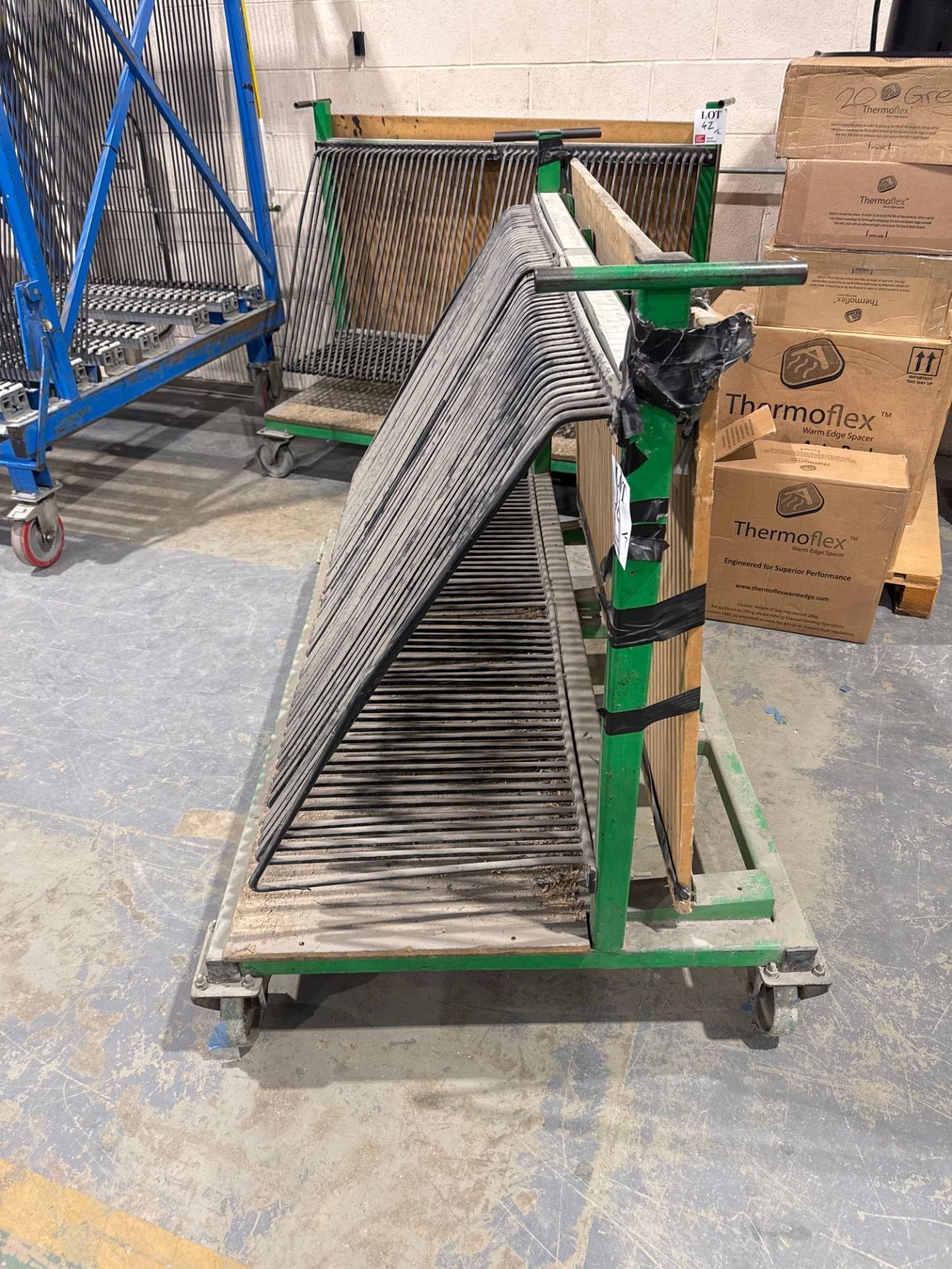 Two x 50 section mobile glass carts
