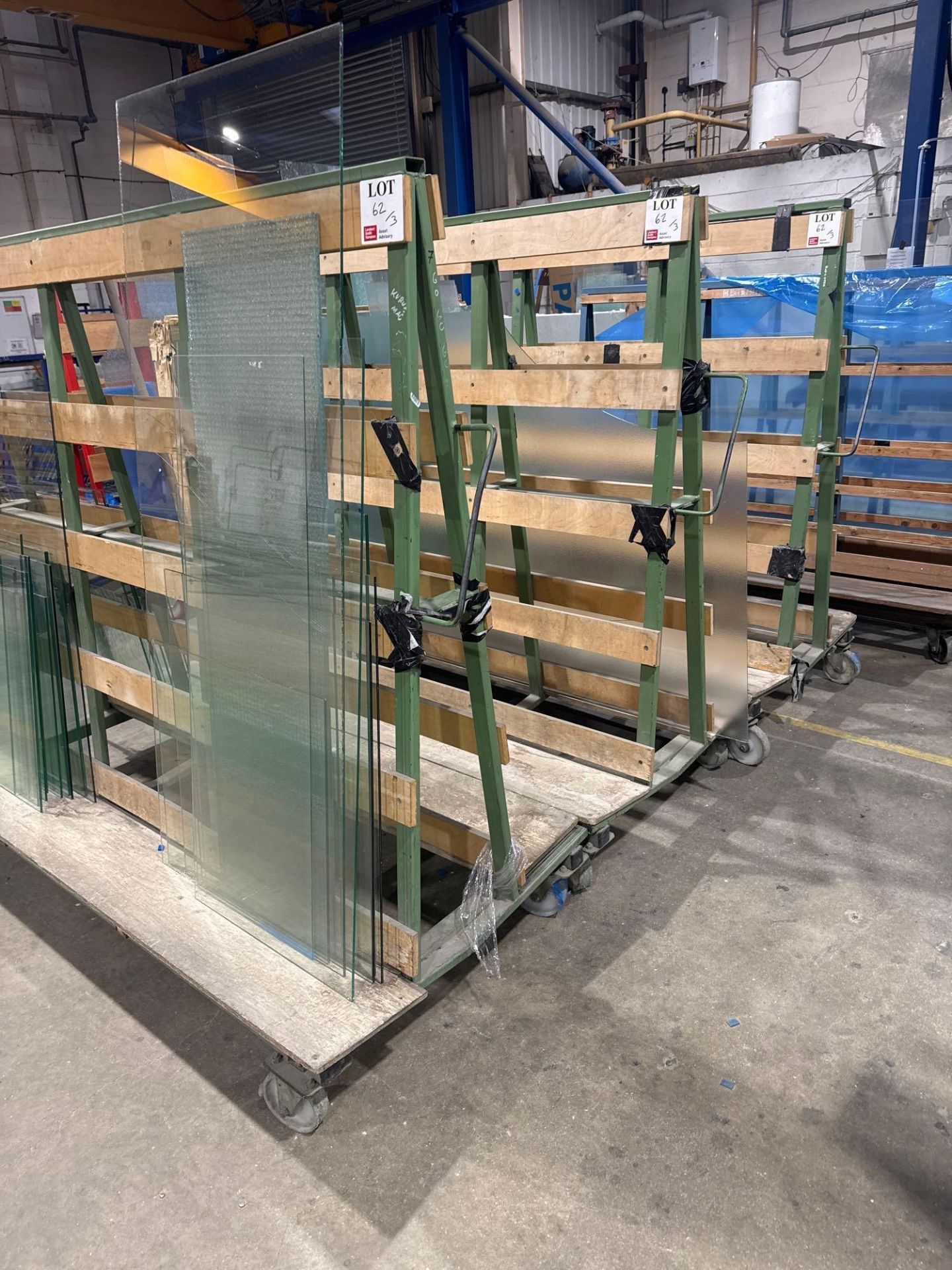 Three steel A frame mobile glass carts