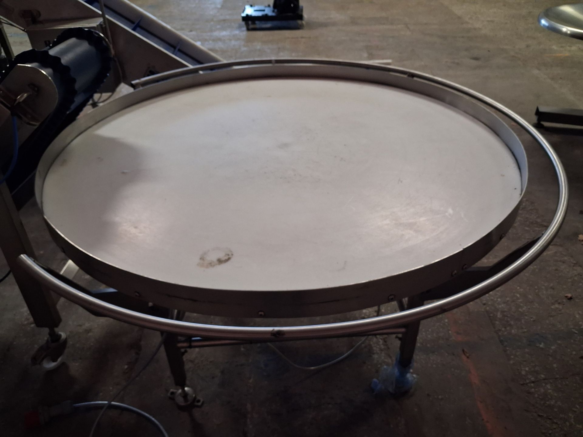 Combination Lazy susan and stainless steel feed conveyor. 2018 Syspal ...
