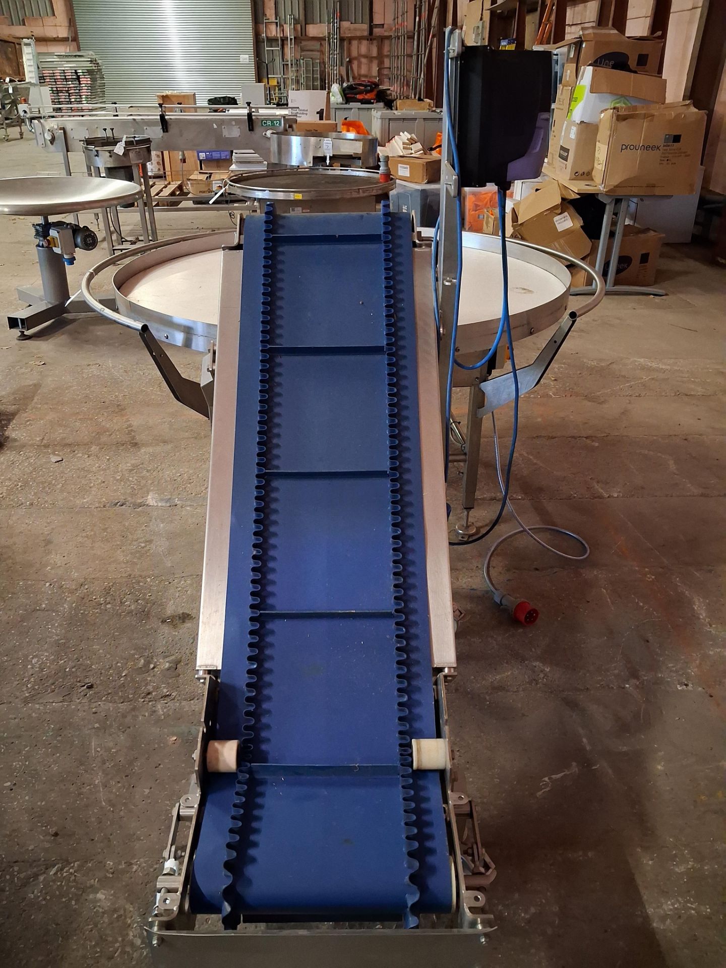 Combination Lazy susan and stainless steel feed conveyor. 2018 Syspal ...