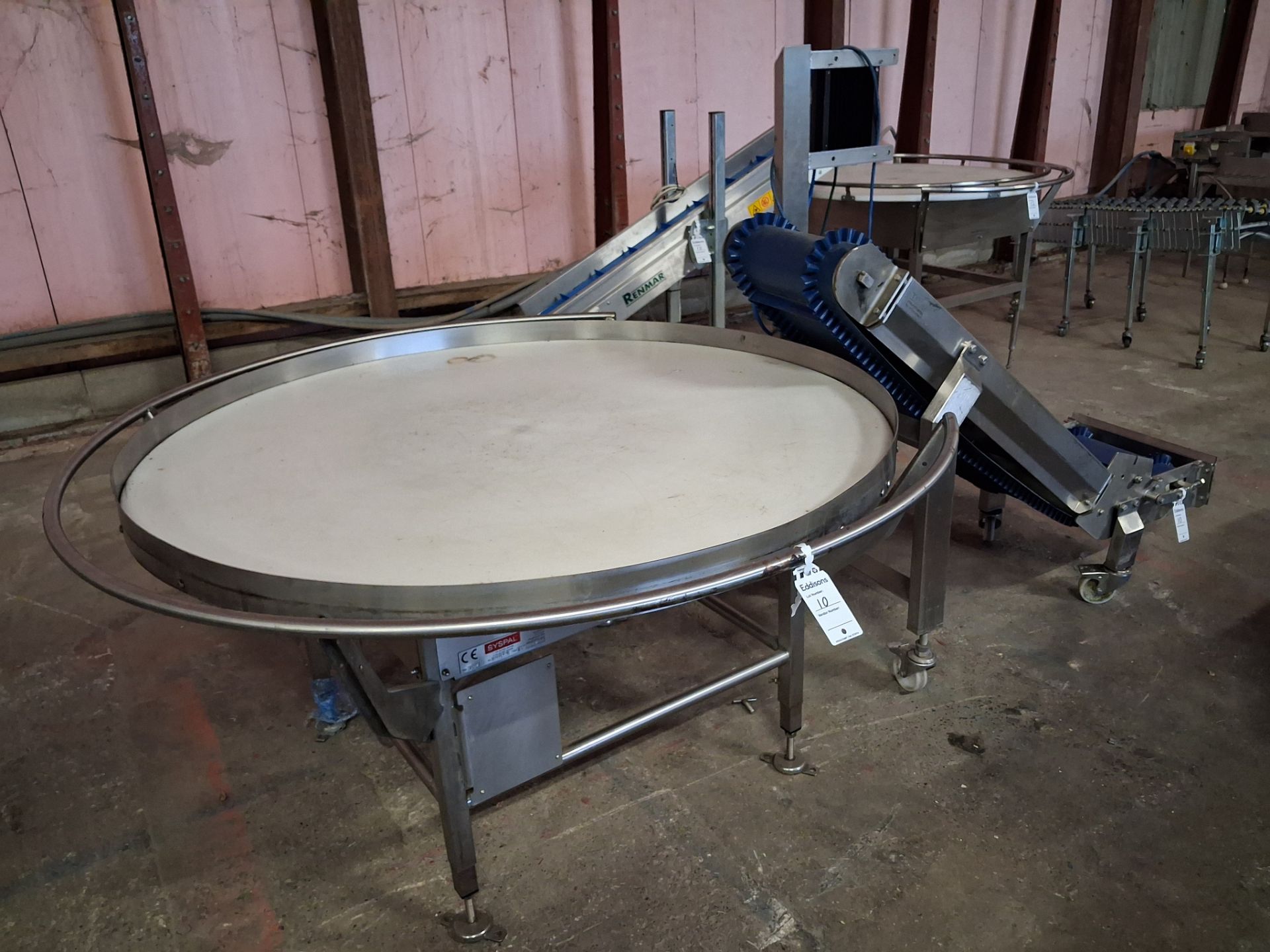 Combination Lazy susan and stainless steel feed conveyor. 2018 Syspal ...