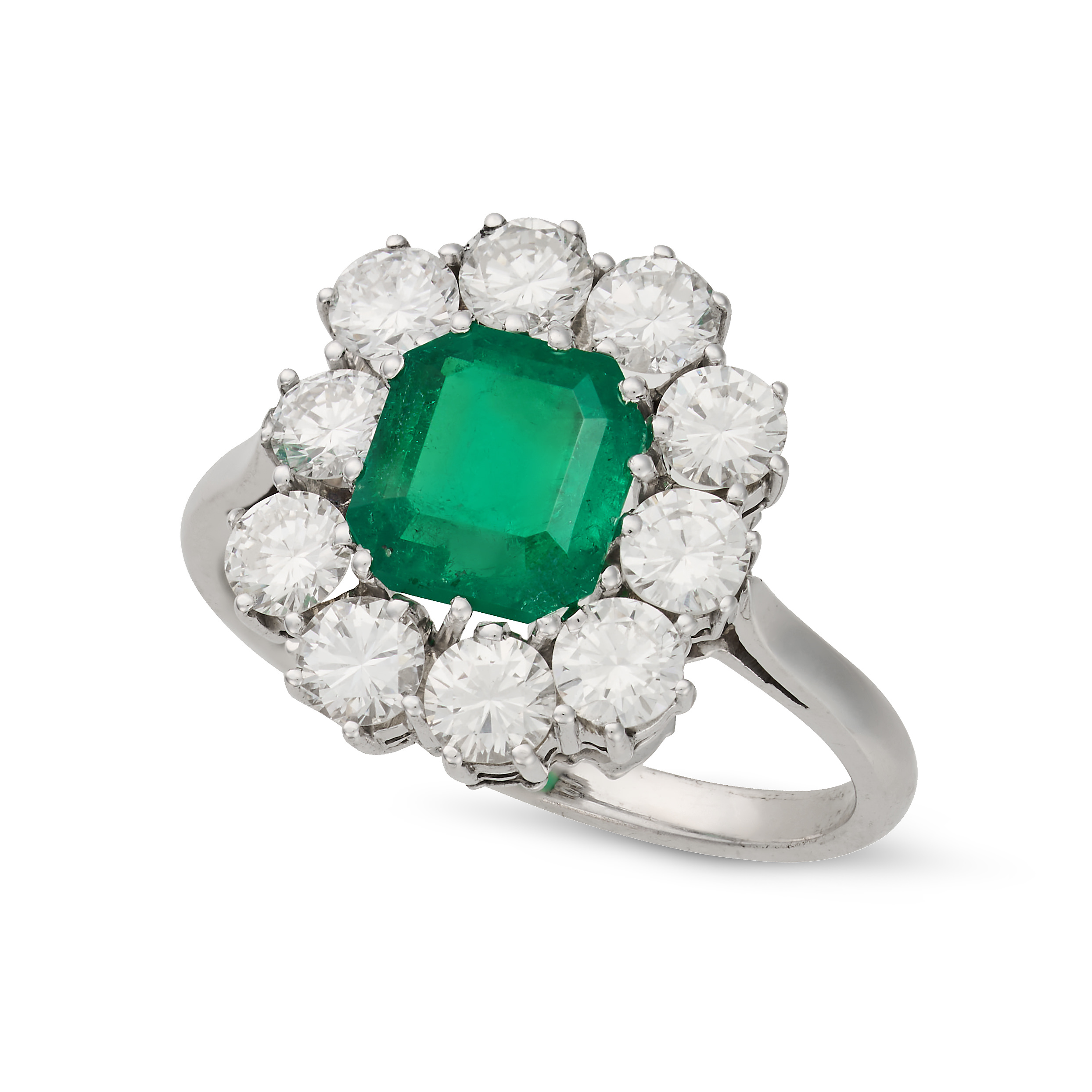 NO RESERVE - A FINE EMERALD AND DIAMOND CLUSTER RING set with an ...