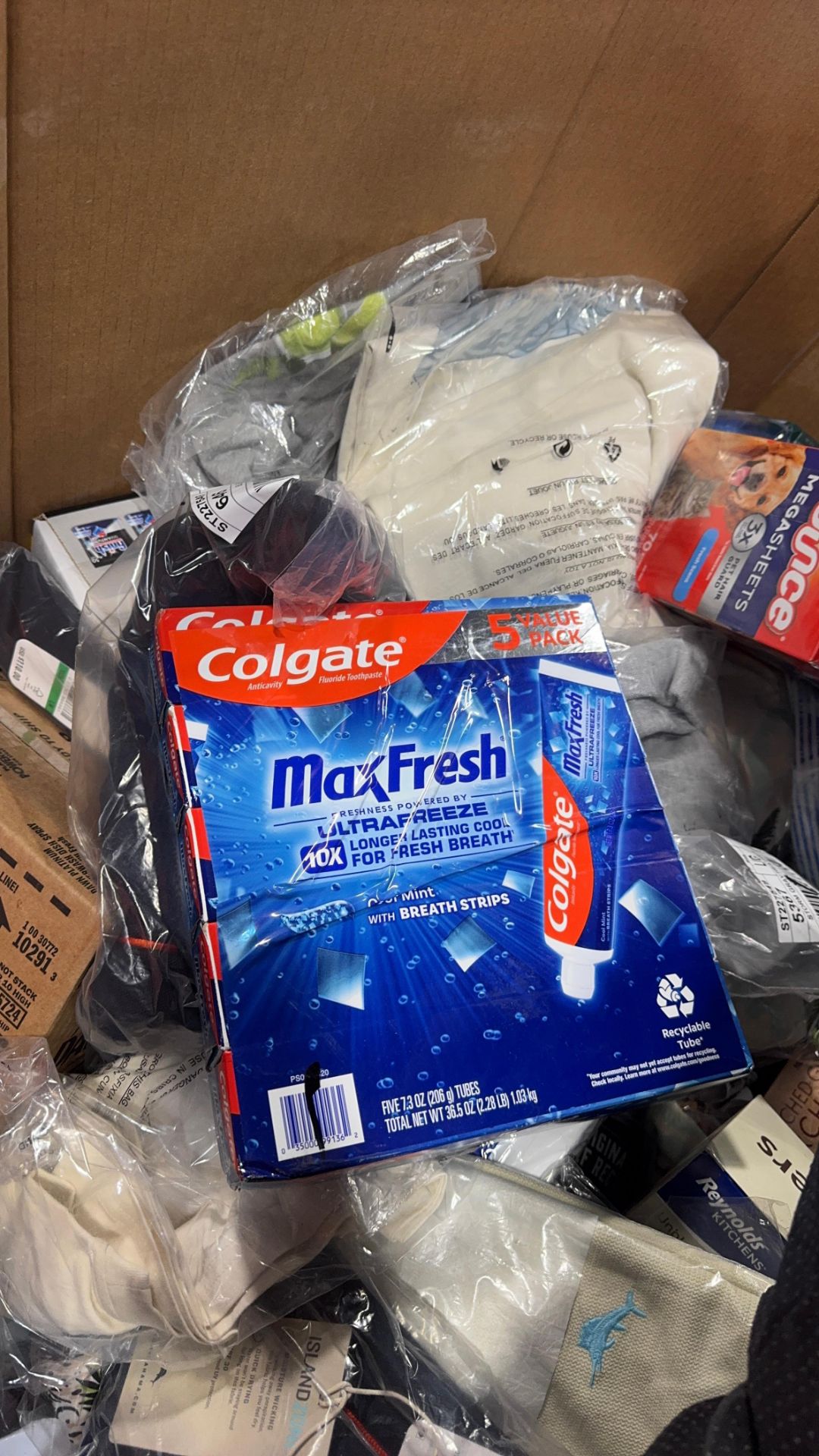 Big box store in a box: detergent, clothing, parchment paper, finish ...