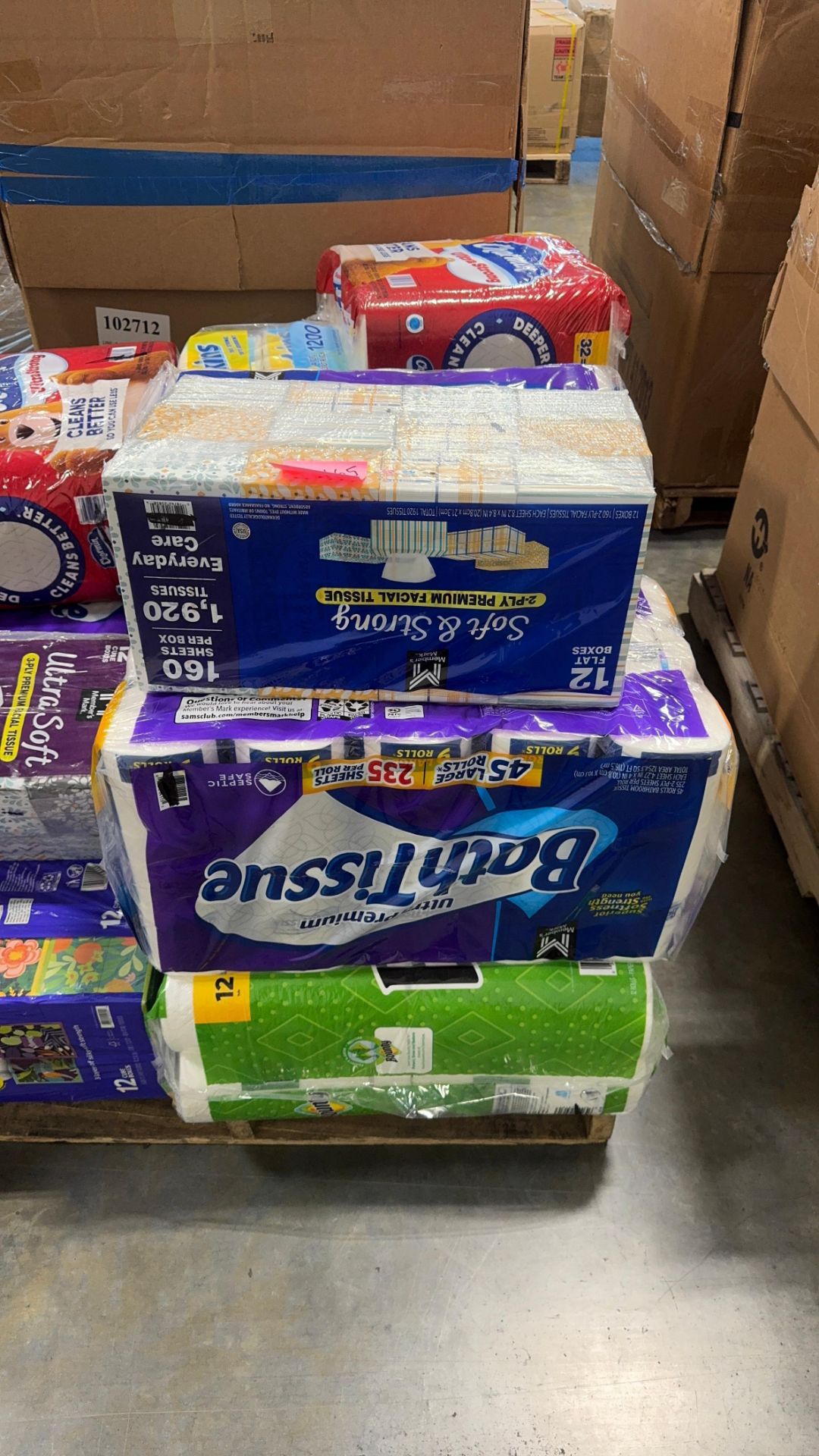 pallet of toilet paper, paper towels and Kleenex