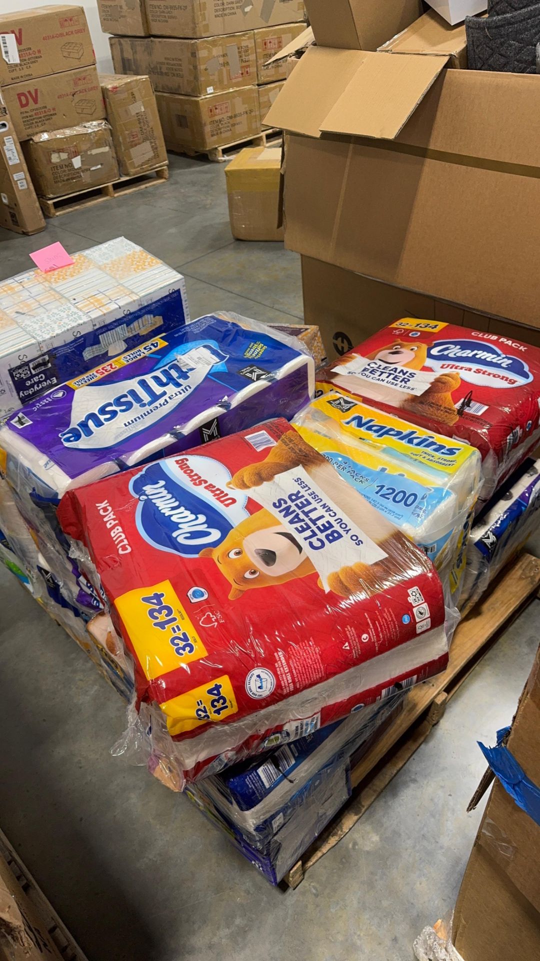 pallet of toilet paper, paper towels and Kleenex