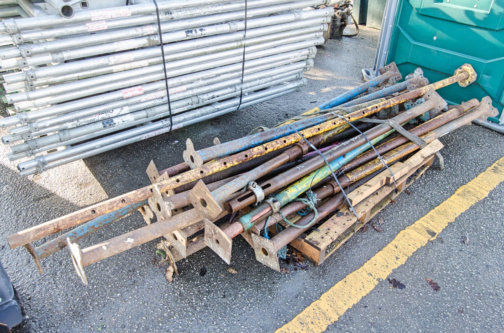 Pallet of steel building props