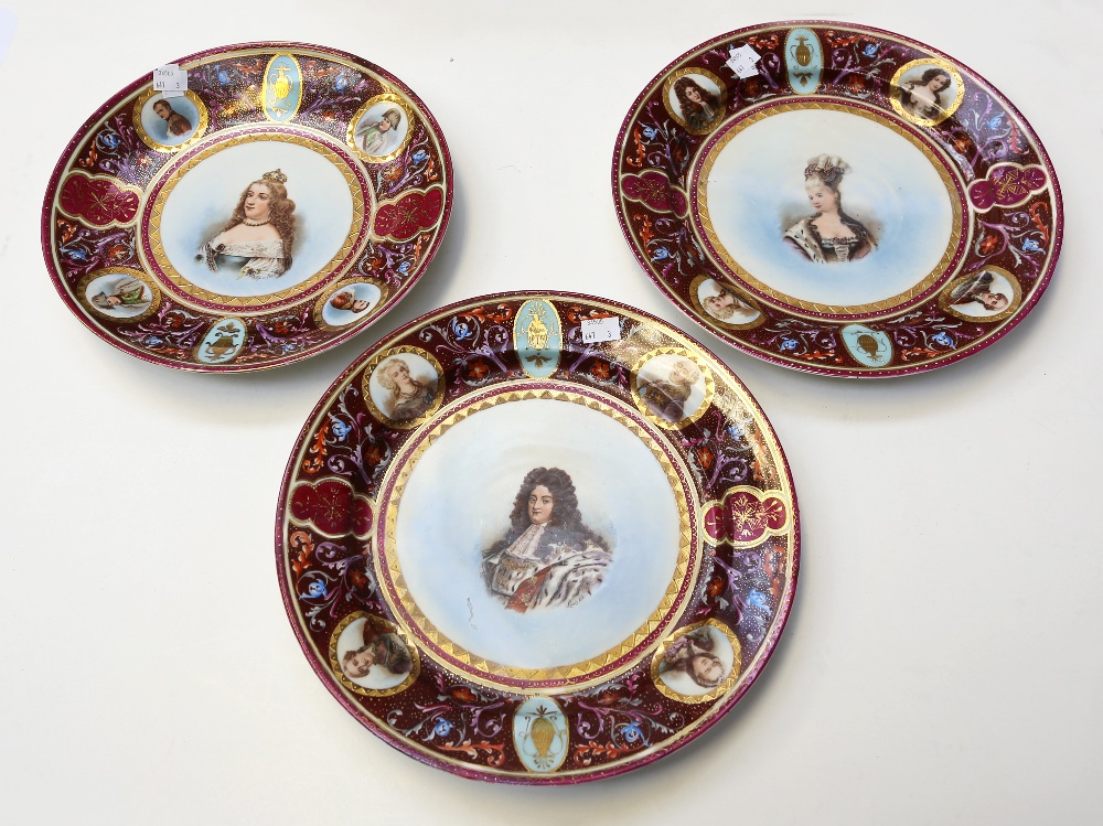 Three early 20th Century Austrian porcelain wall hanging chargers with ...