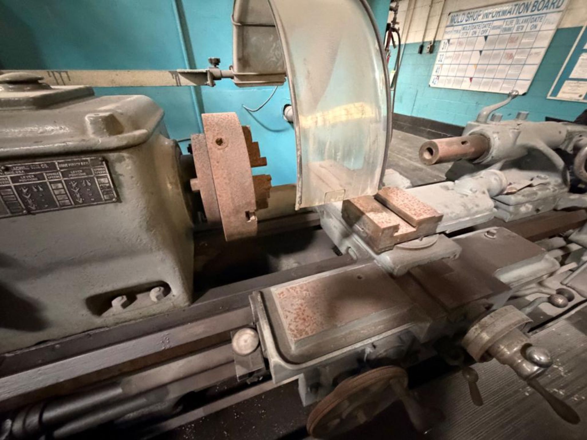 This is a 1954 Monarch lathe equipped with a 22.5-inch swing ...