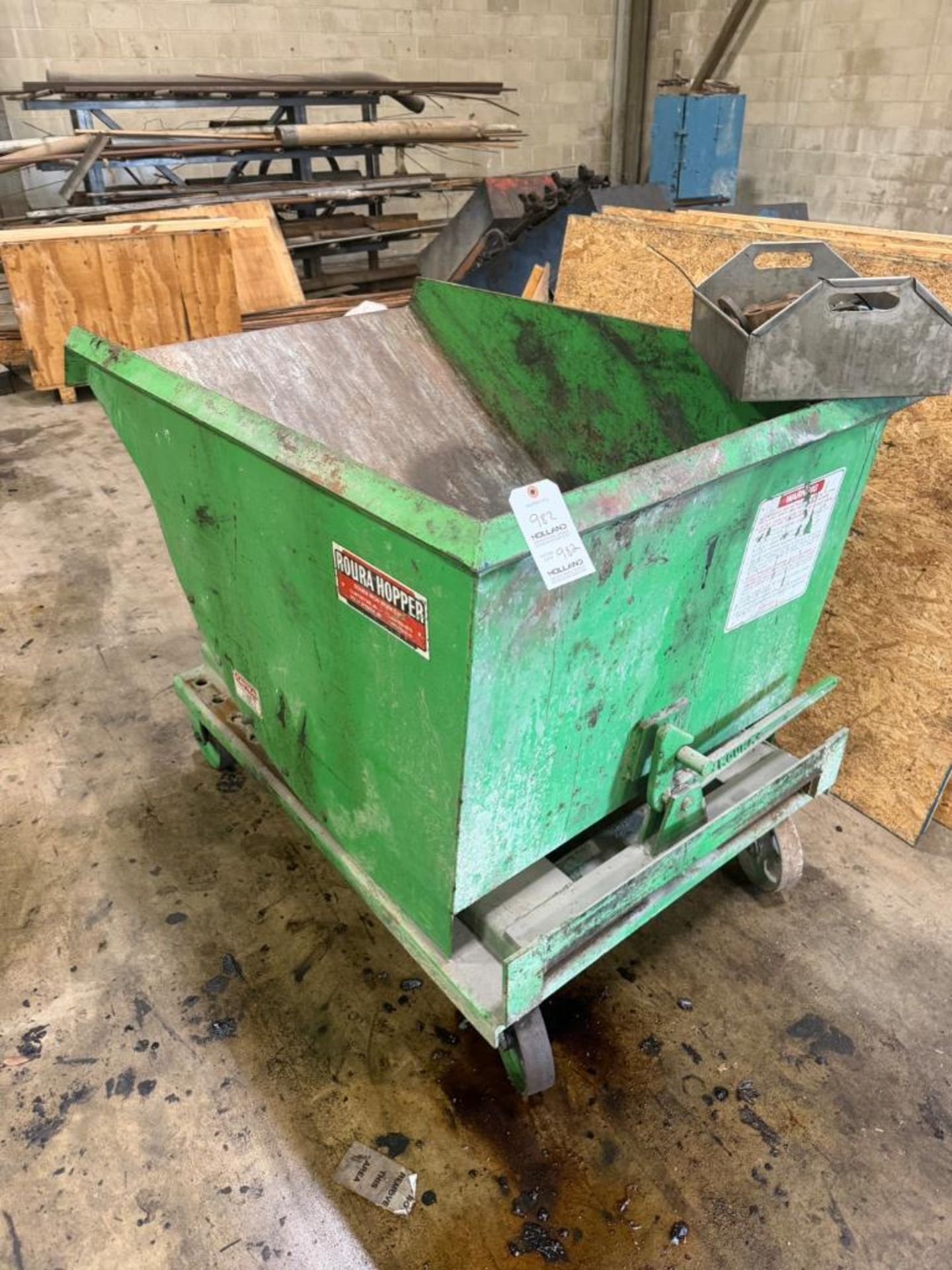 This lot includes three used self-dumping hoppers manufactured by Roura ...