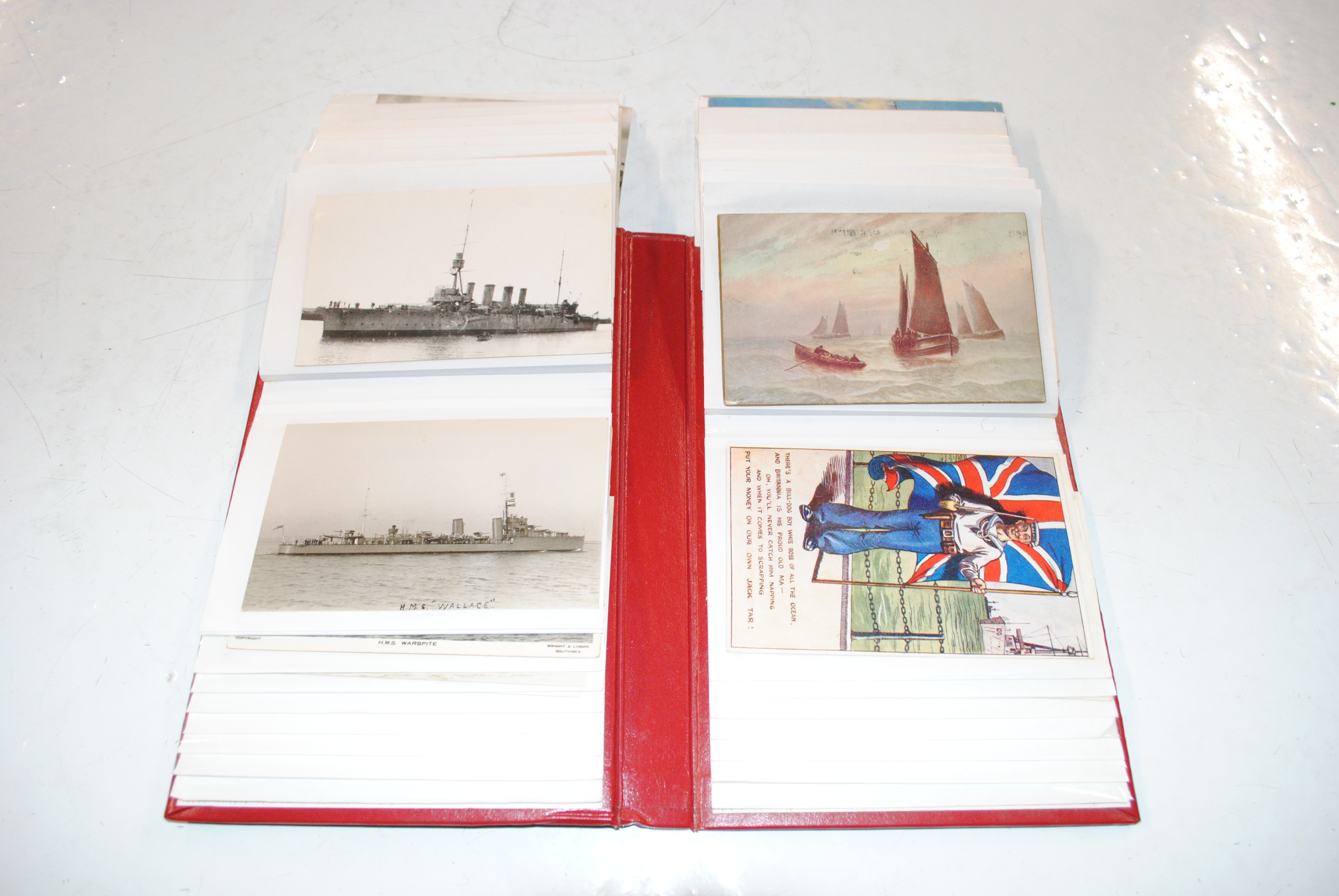 An album of Naval and Commercial shipping postcards