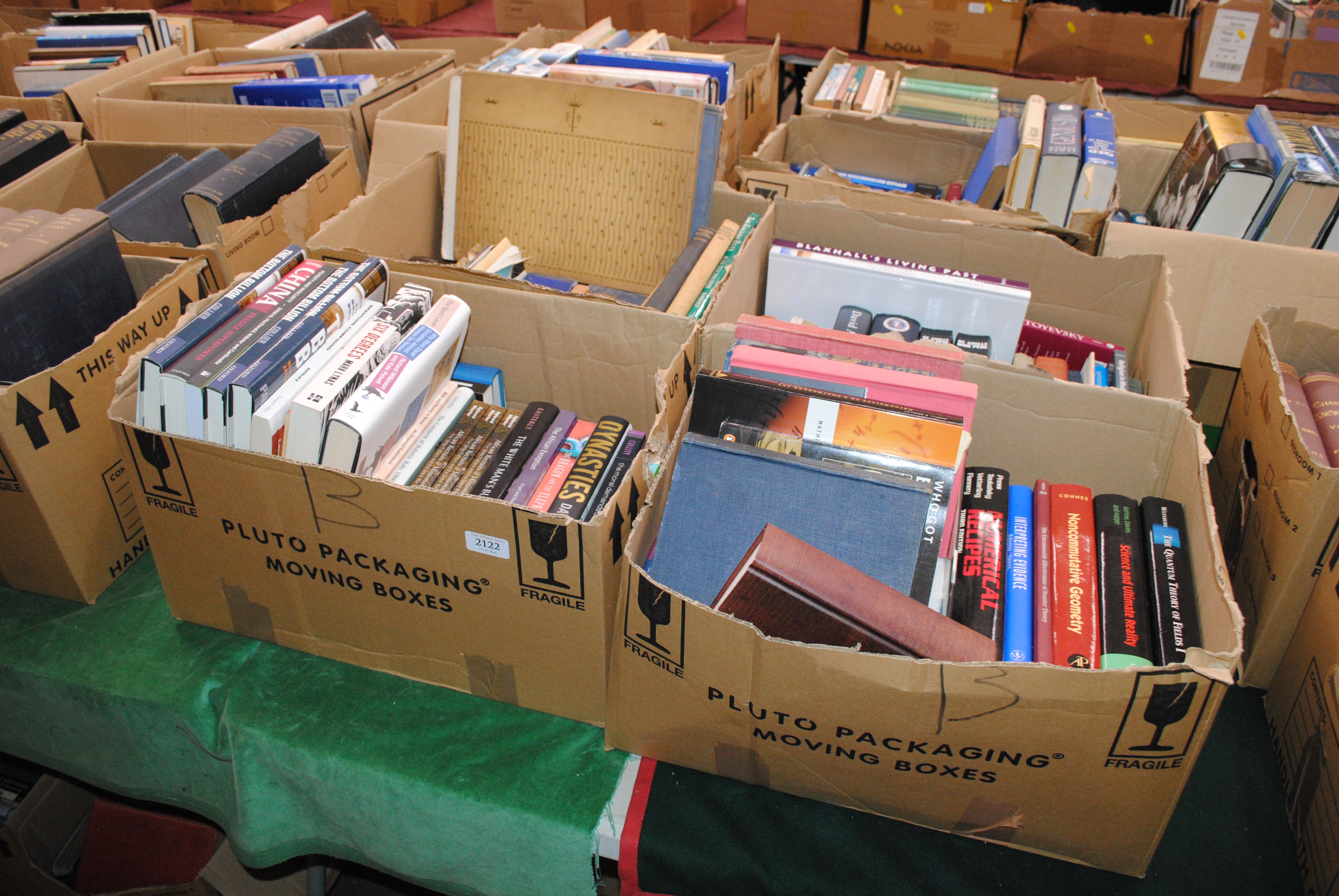 Four boxes of various books, to include biographies, local works, a ...