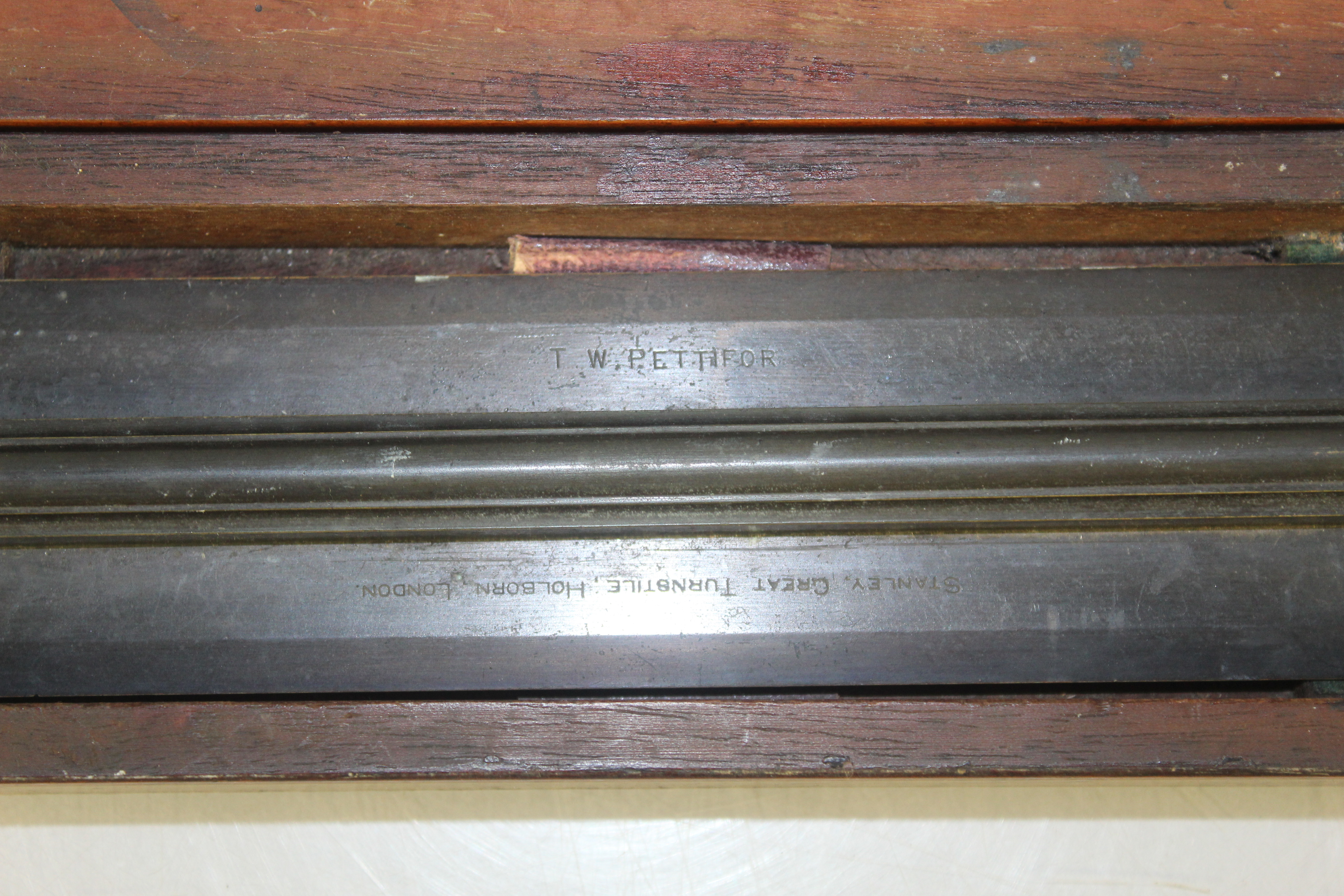 A 19th Century brass parallel roll in mahogany case