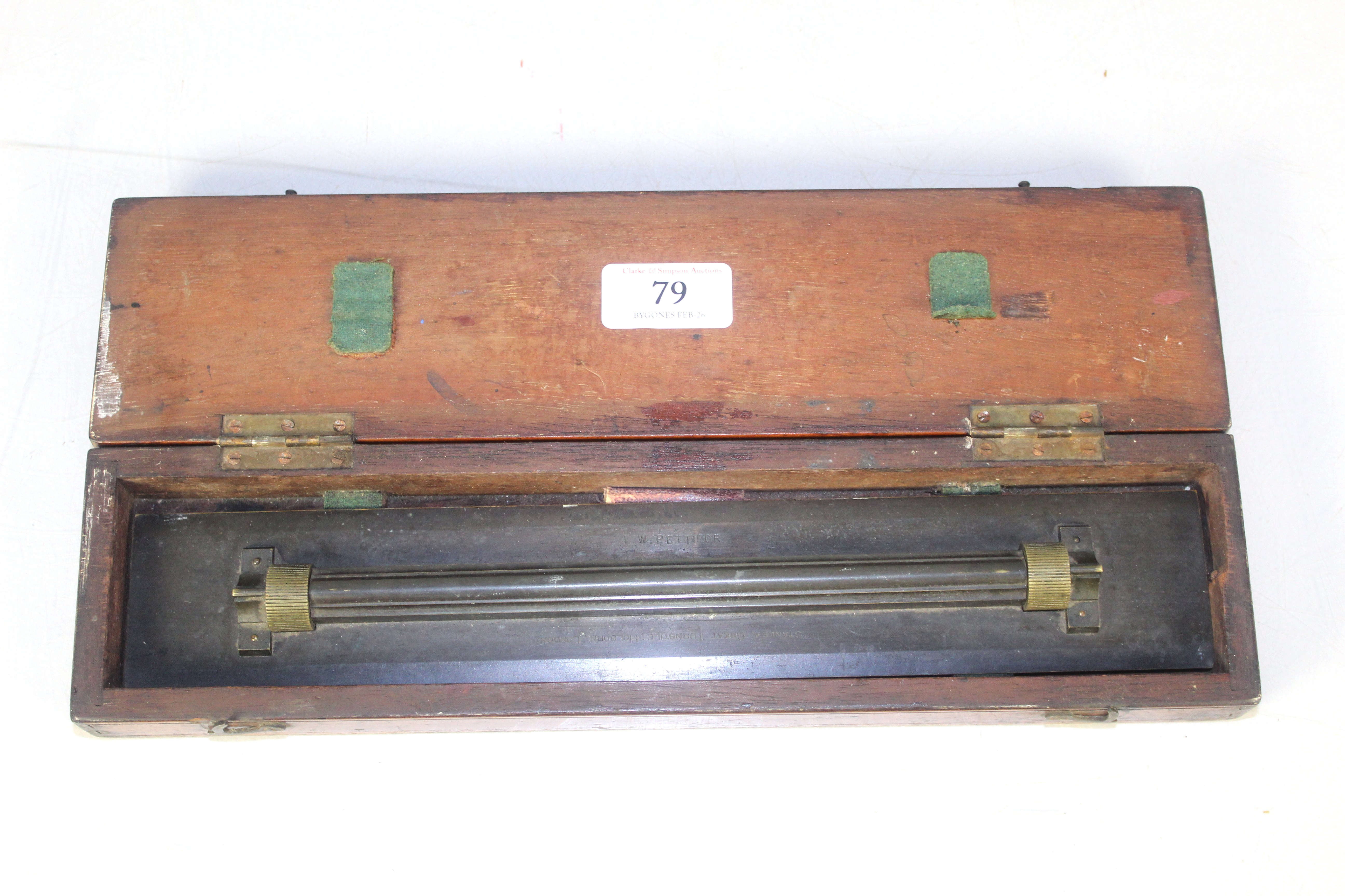 A 19th Century brass parallel roll in mahogany case